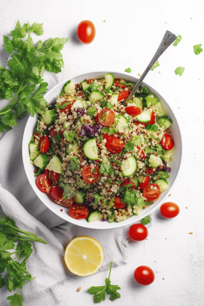 Quinoa tabbouleh salad with red cherry tomatoes, orange paprika ...