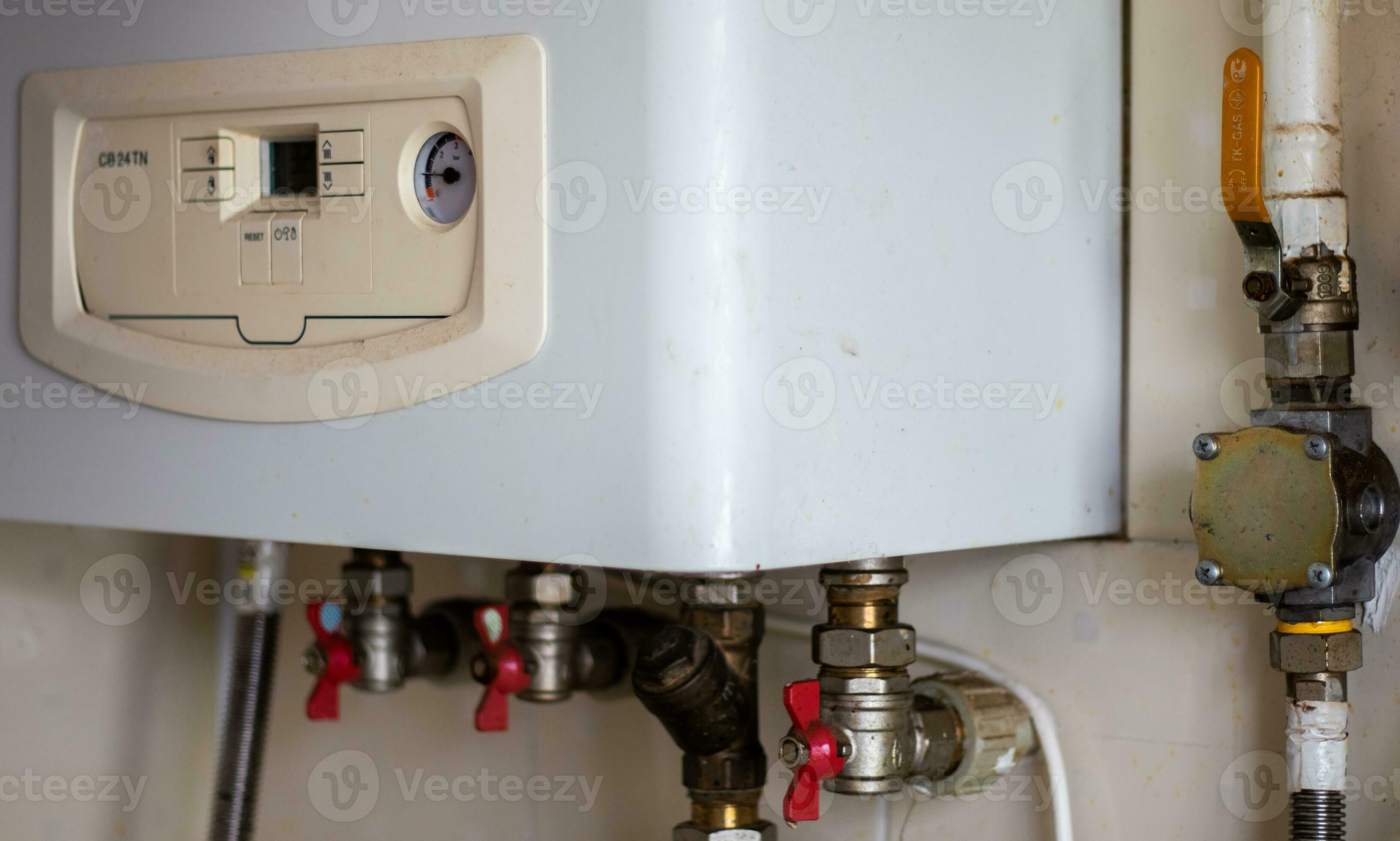 Heating gas boiler. Symbolic image of the heating season at home. The ... Heating gas boiler. Symbolic image of the heating season at home. The ...