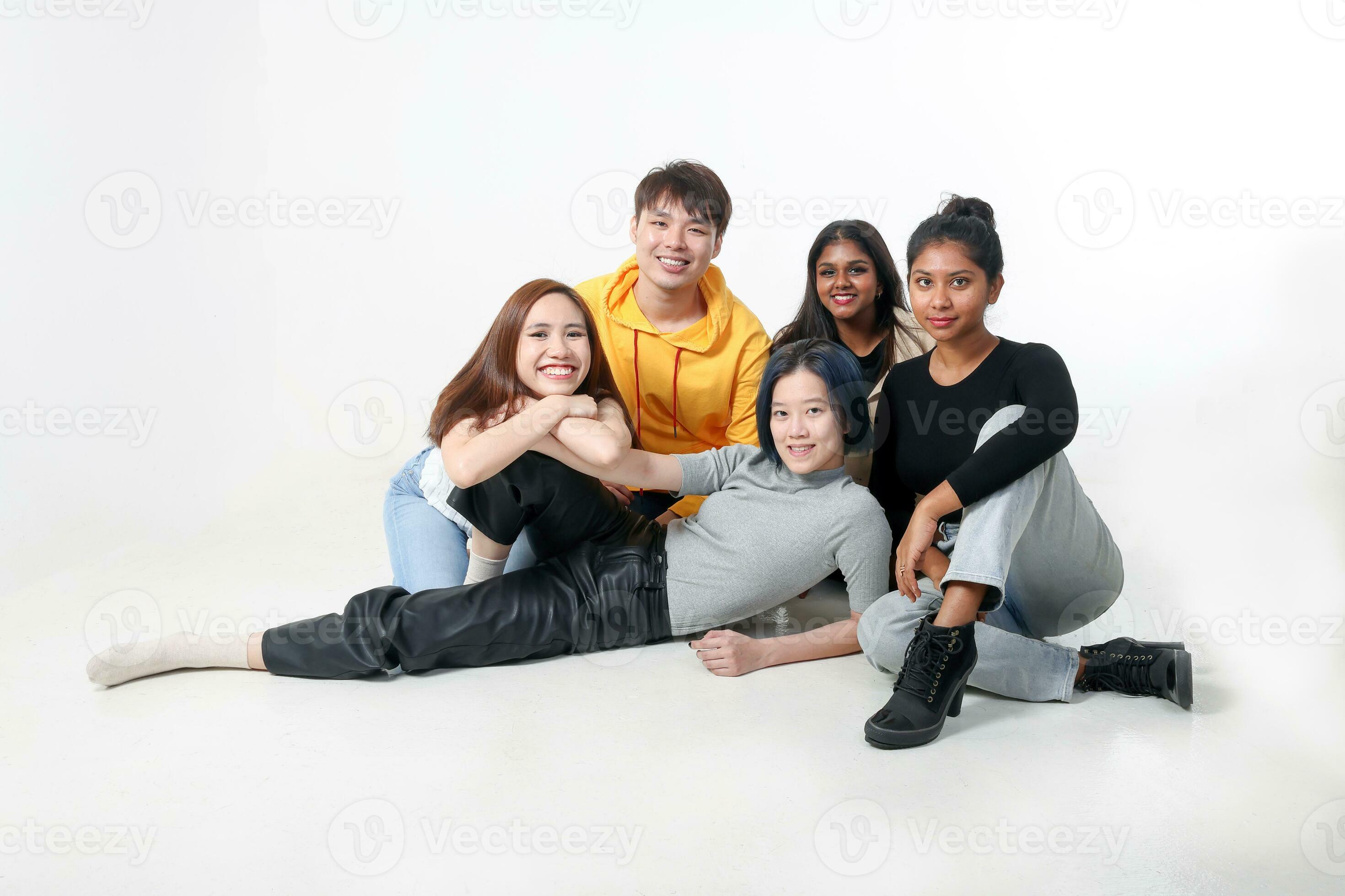 Group of young south east asian mixed race man woman chinese malay indian sit lying pose on ...