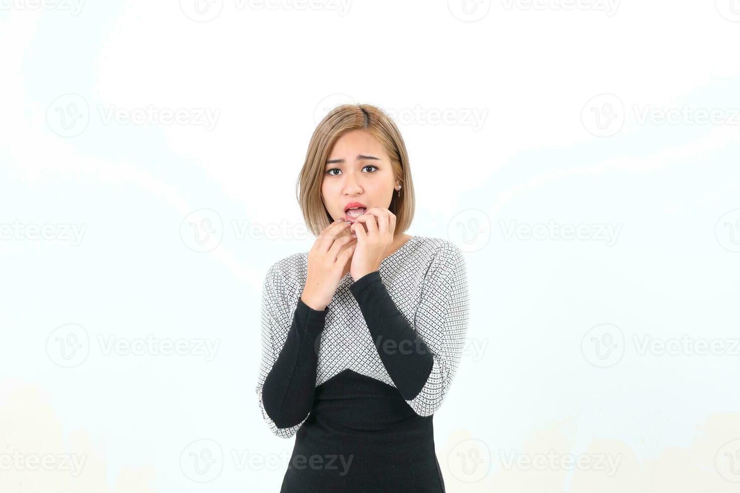South east Asian Chinese Woman facial expression stand afraid worried hand on face moth 24549871 ...