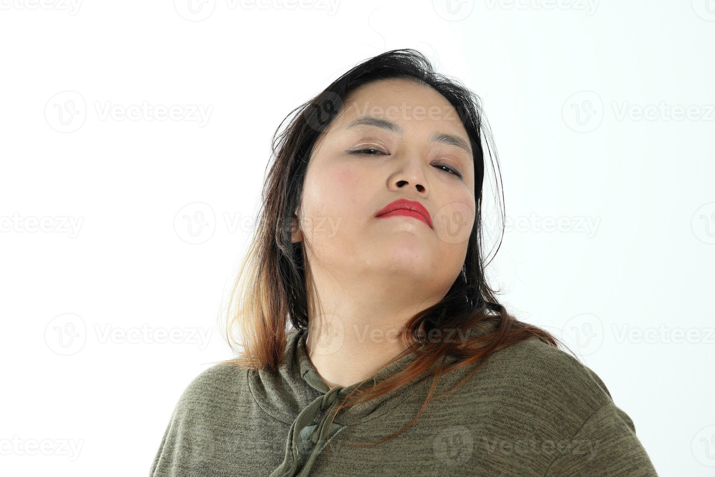 Young plus size south east asian woman pose face expression emotion on ... Young plus size south east asian woman pose face expression emotion on ...