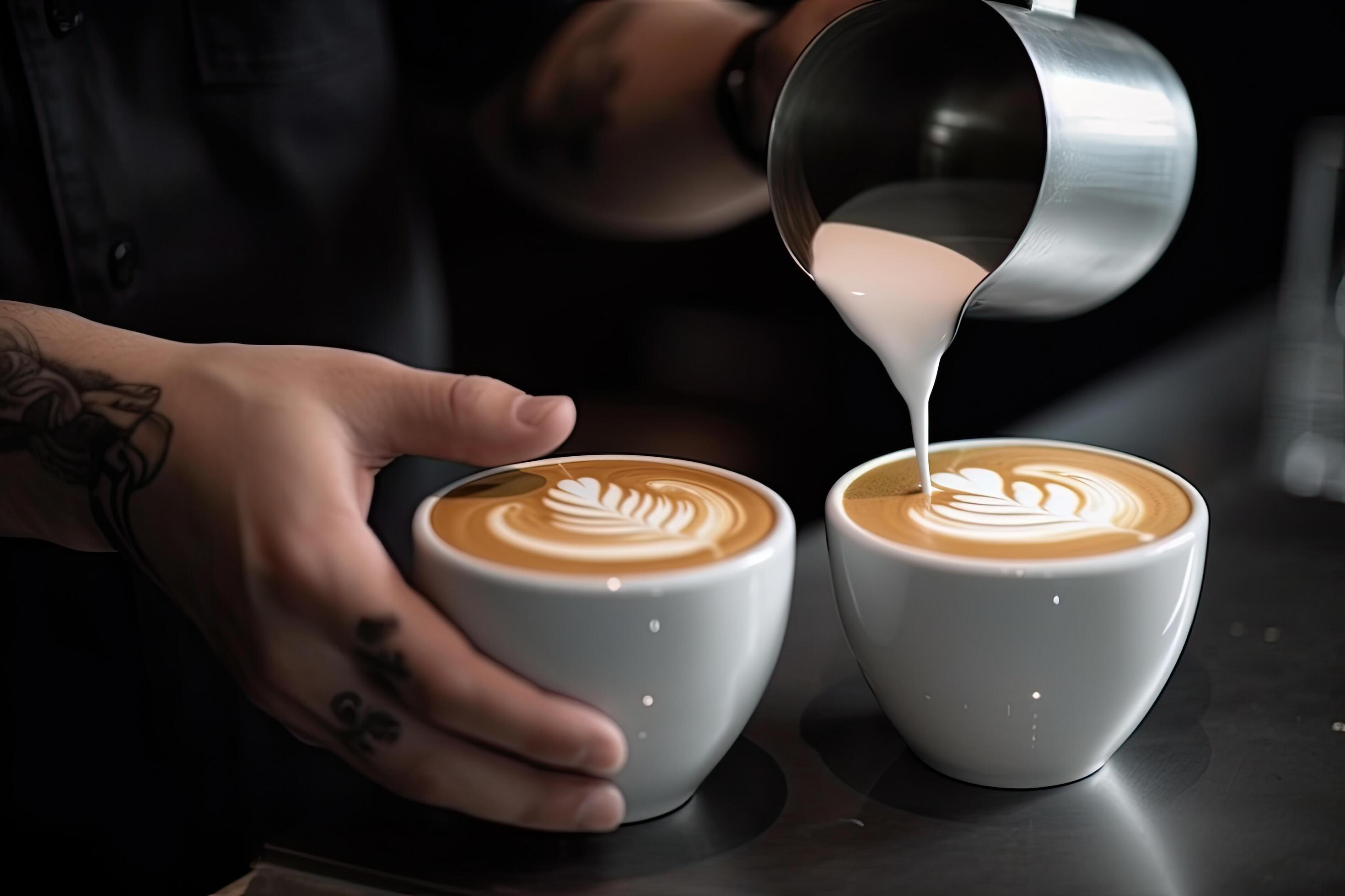 Barista Pouring Milk Into A Cup Of Latte Art Coffee A Coffee Cup In A