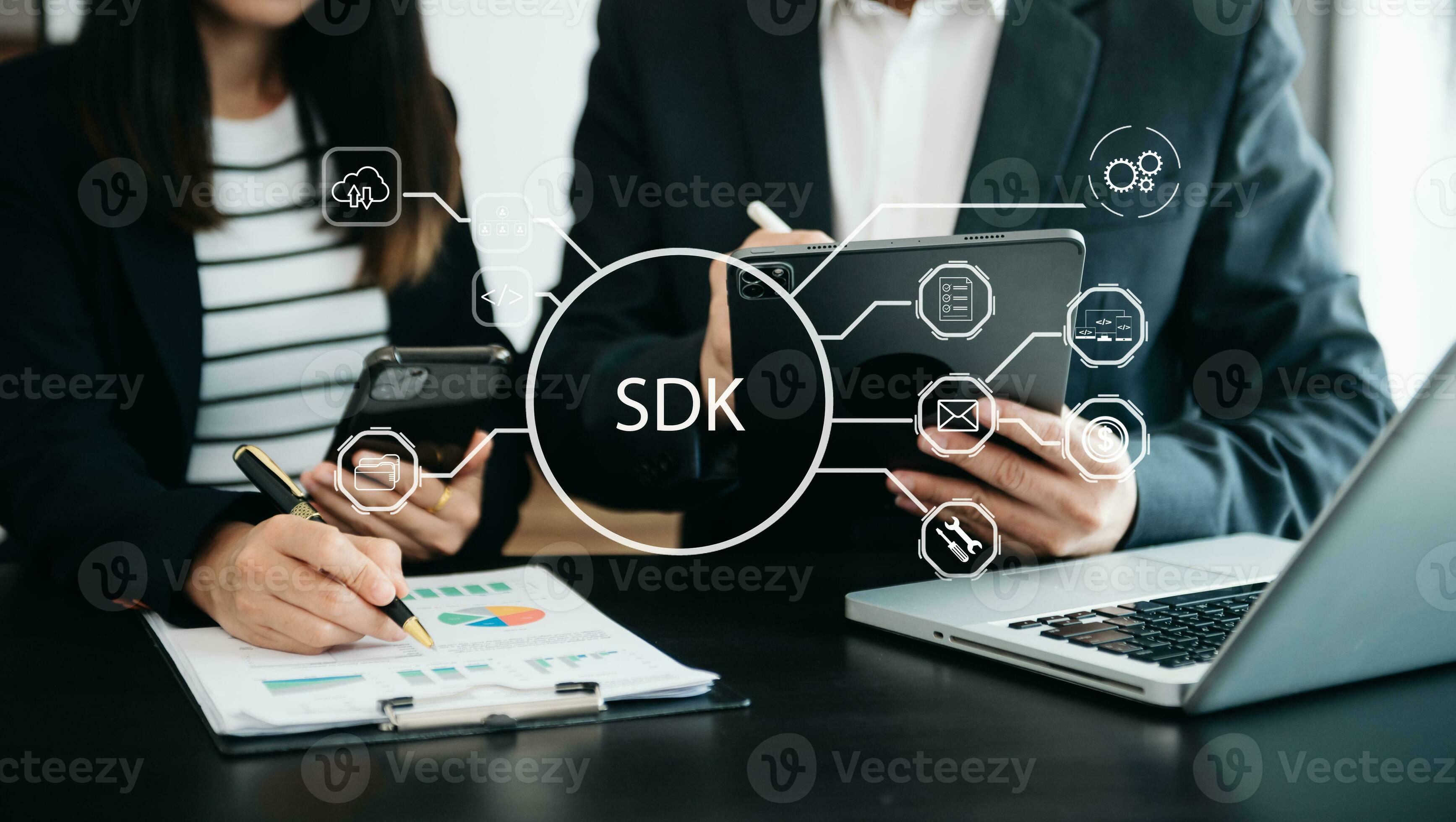 SDK Software development kit programming language technology concept, Person typing laptop ...