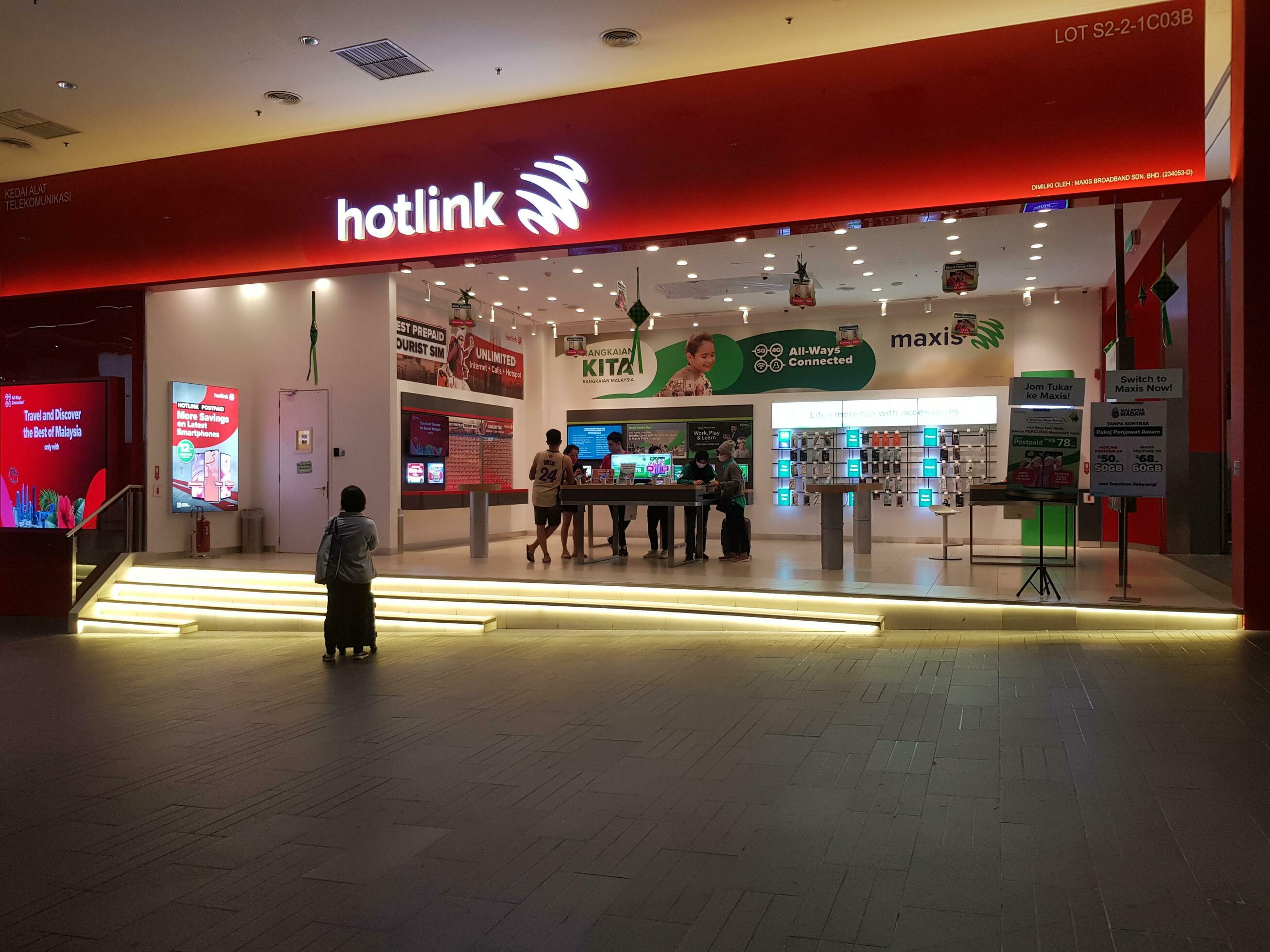 Kuala Lumpur, Malaysia in May 2023. The Maxis Hotlink shop is located immediately right after ...