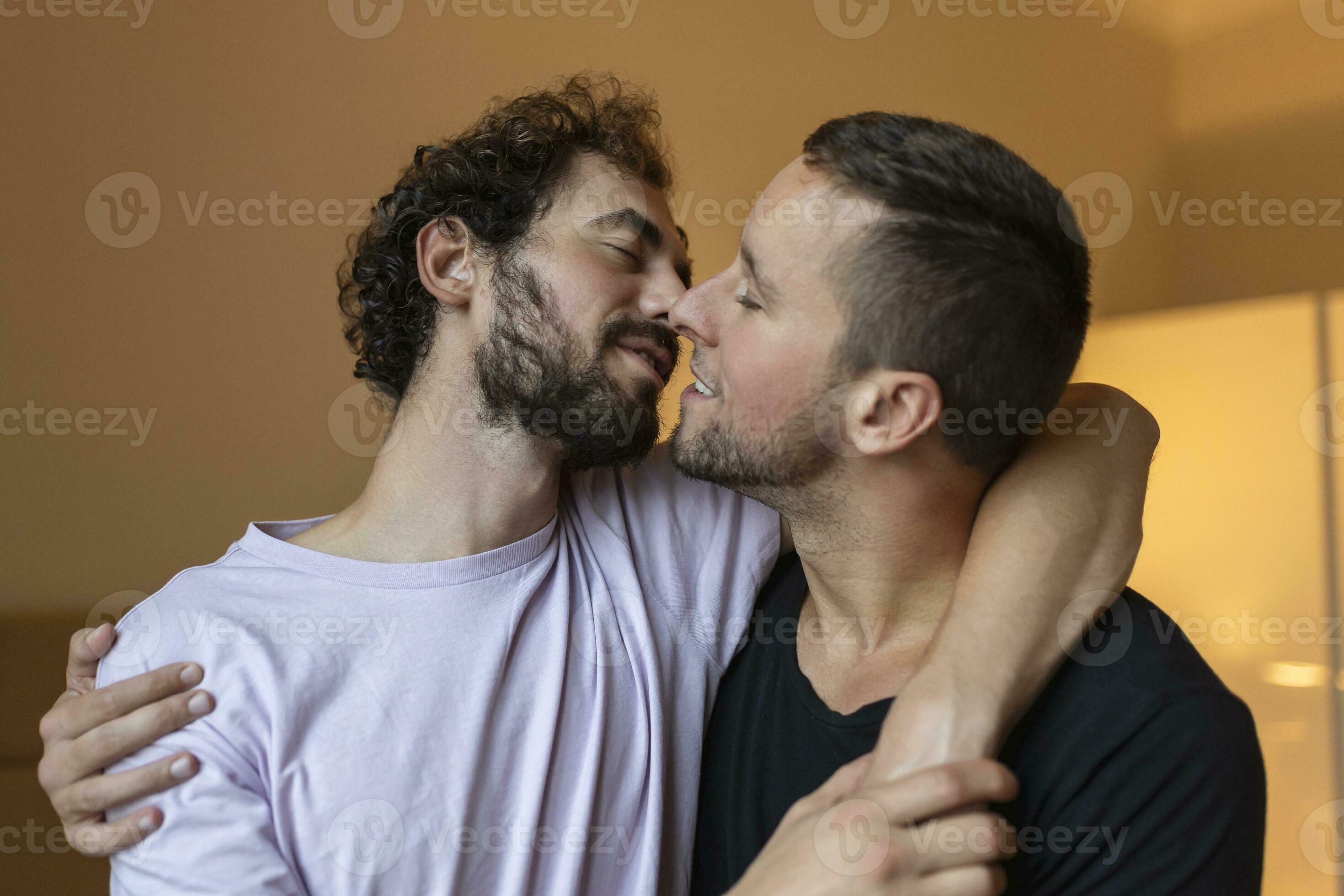 Two young man lgbtq gay couple dating in love hugging enjoying intimate ... Two young man lgbtq gay couple dating in love hugging enjoying intimate ...