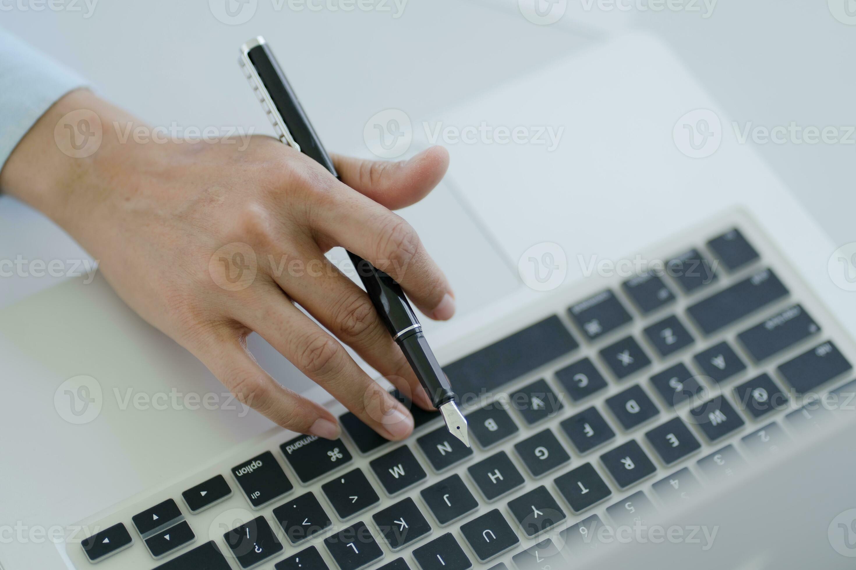 Business man working using laptop computer Hands typing keyboard. Professional investor working ...