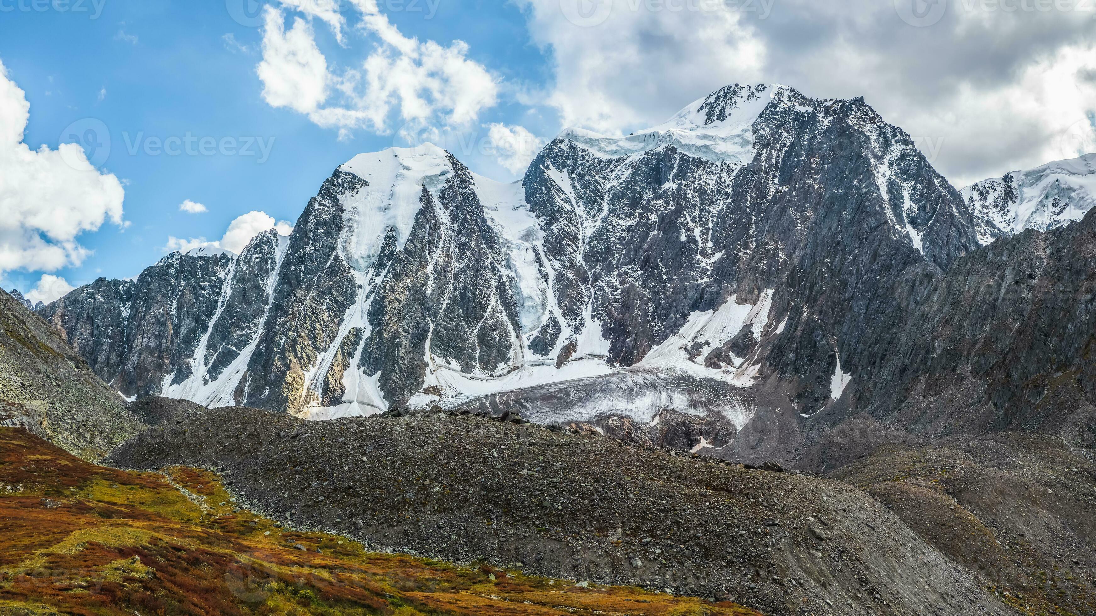 Atmospheric alpine landscape with massive hanging glacier on snowy ...