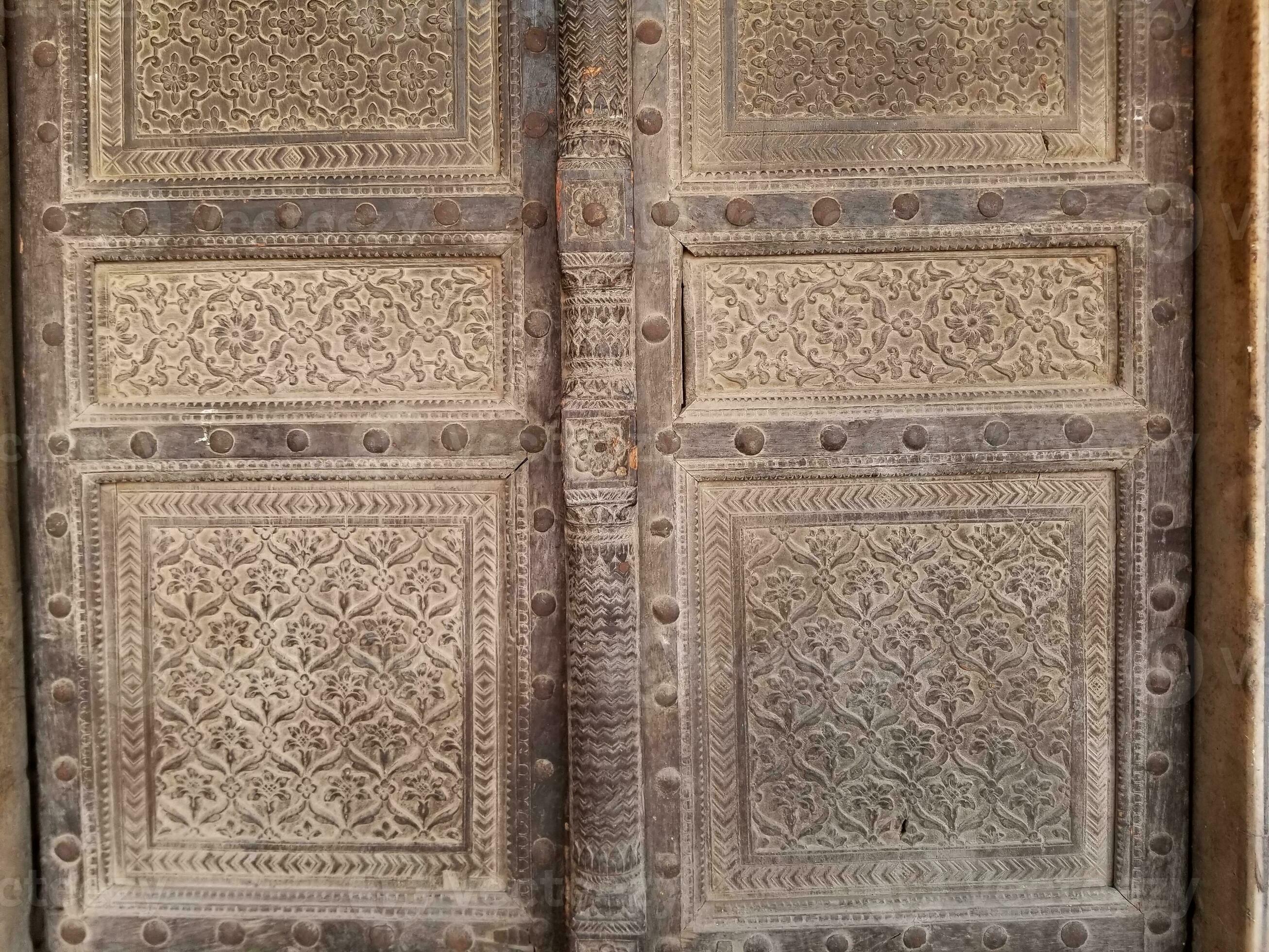 Old wood texture door at lahore fort 24857675 Stock Photo at Vecteezy