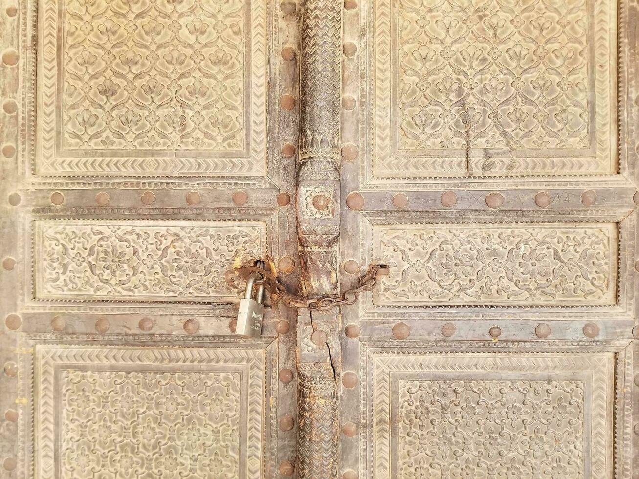 Old wood texture door at lahore fort 24857732 Stock Photo at Vecteezy