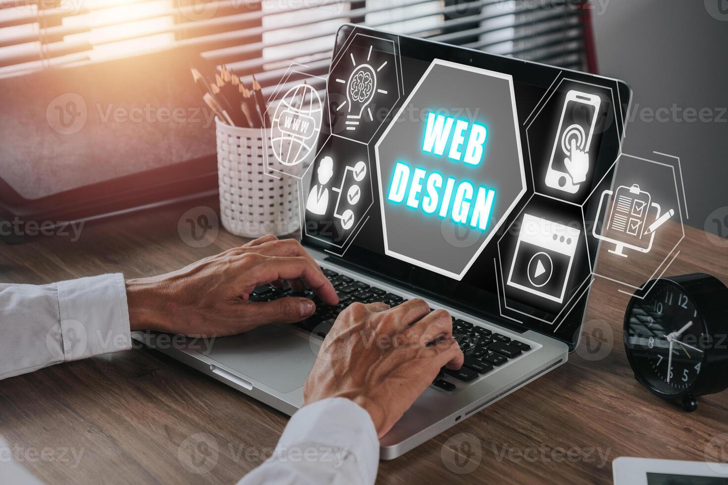 Web design concept, Person working on laptop computer with web design icon on virtual screen ...