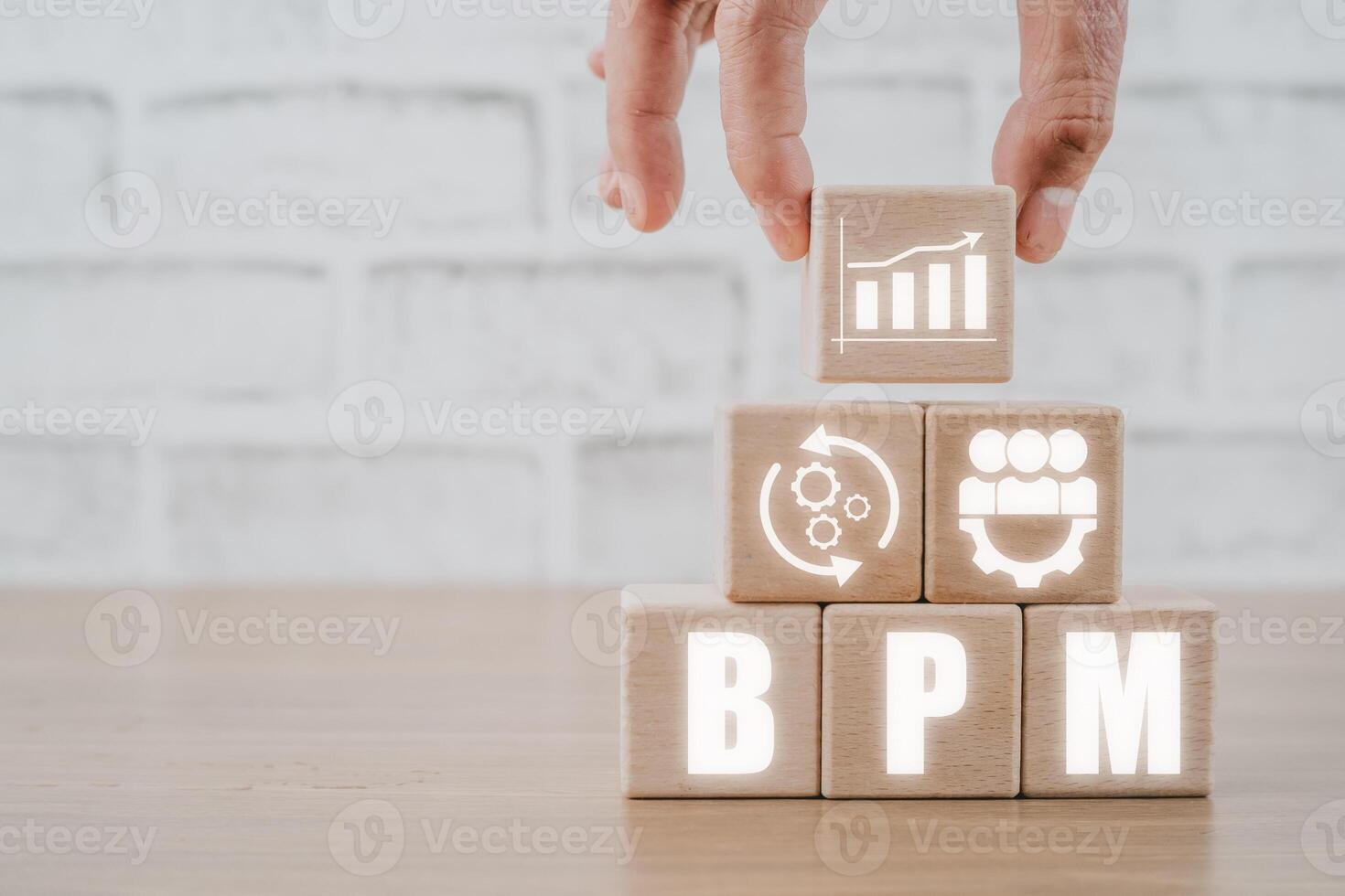BPM, Business Process Management concept, Hand holding wooden block ... BPM, Business Process Management concept, Hand holding wooden block ...