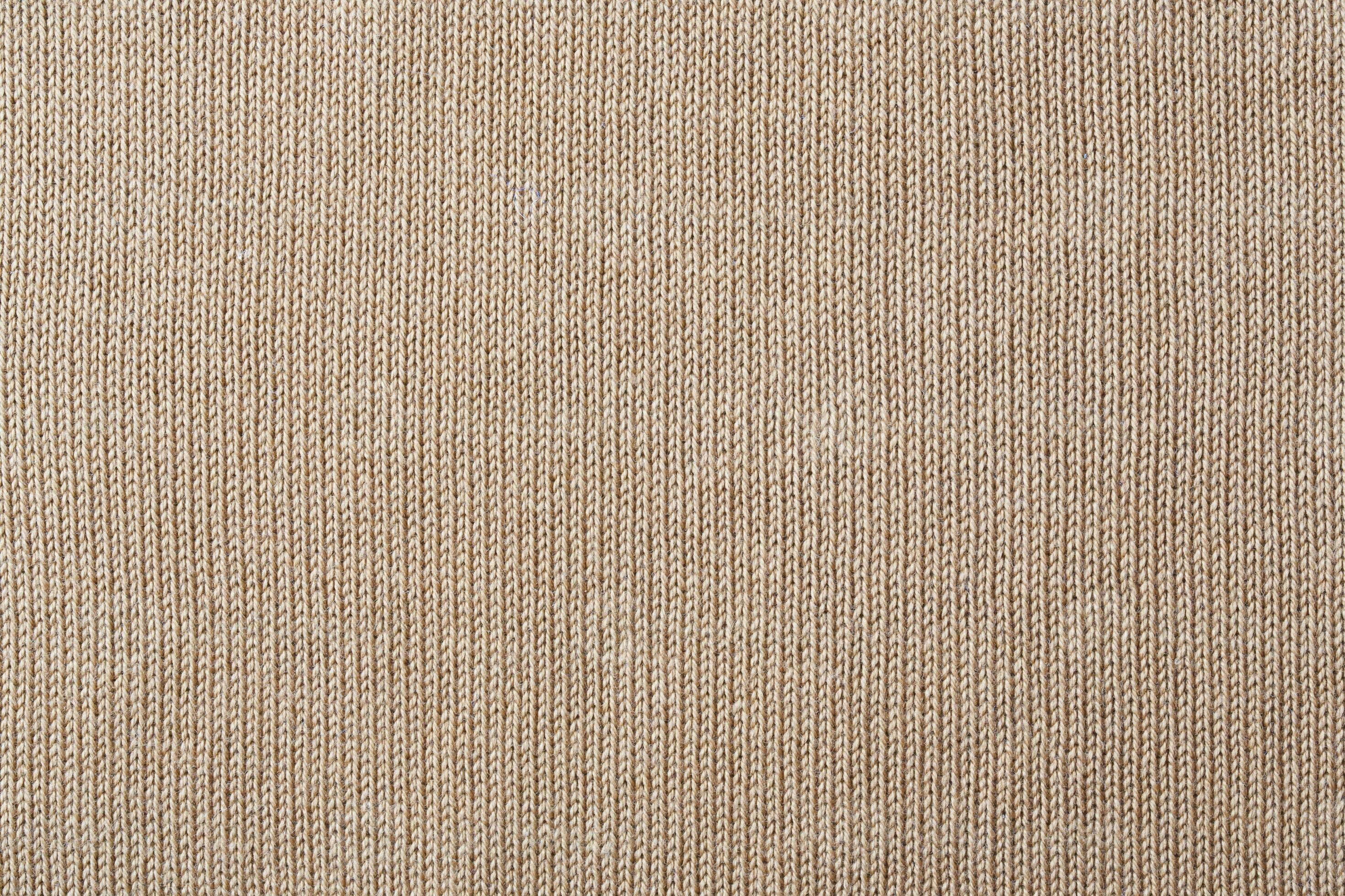 Brown knitted sweater - background 24988140 Stock Photo at Vecteezy