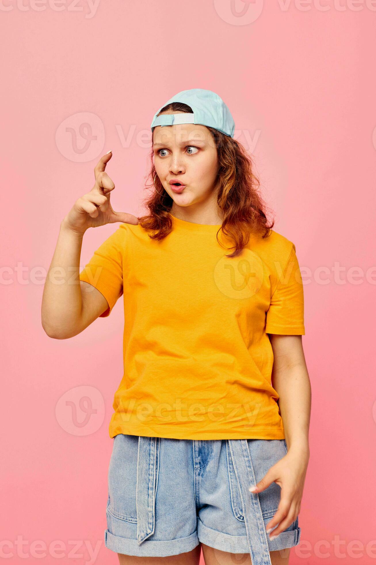 portrait of a young woman grimace posing summer style fashion isolated ...