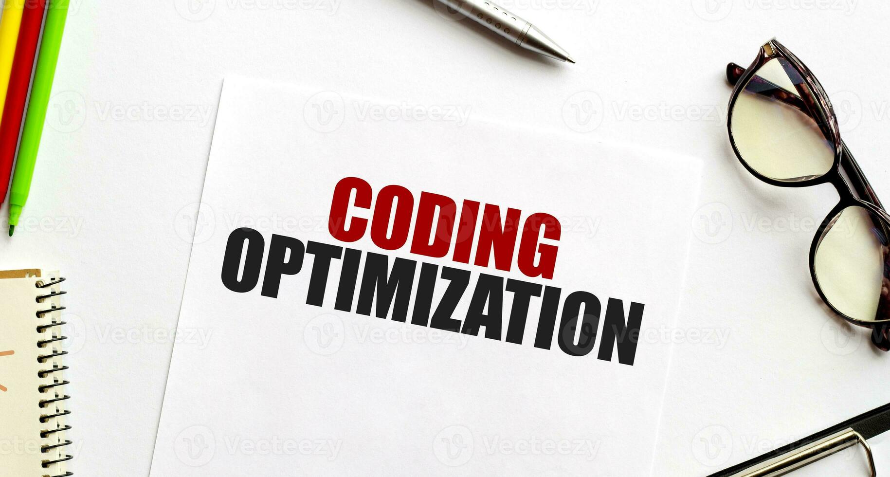 CODING OPTIMIZATION on paper with glasses, pen and colourful pencils 25074503 Stock Photo at ...