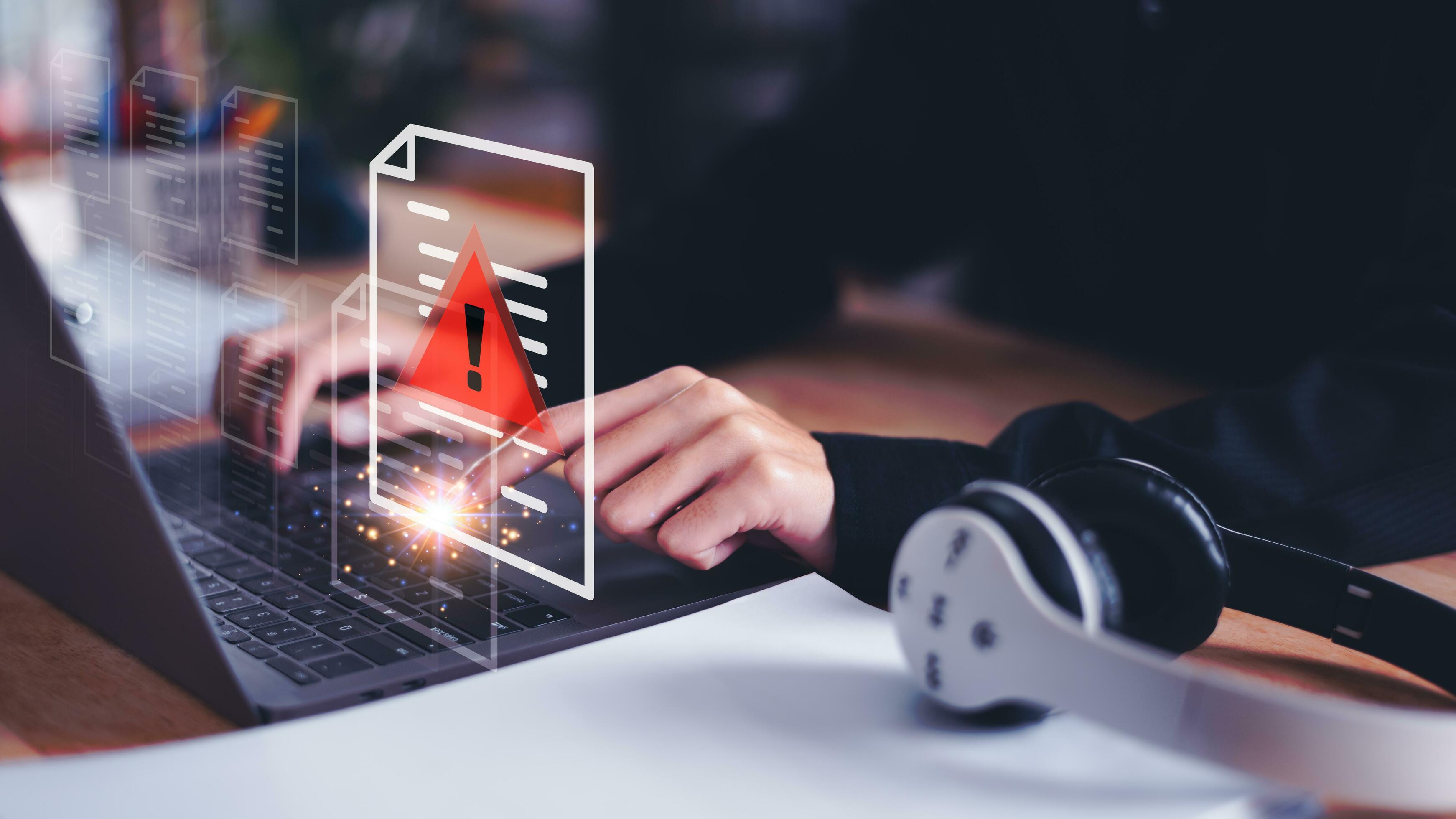 Programmer and virtual icons , exclamation mark ,alarm,computer virus ...