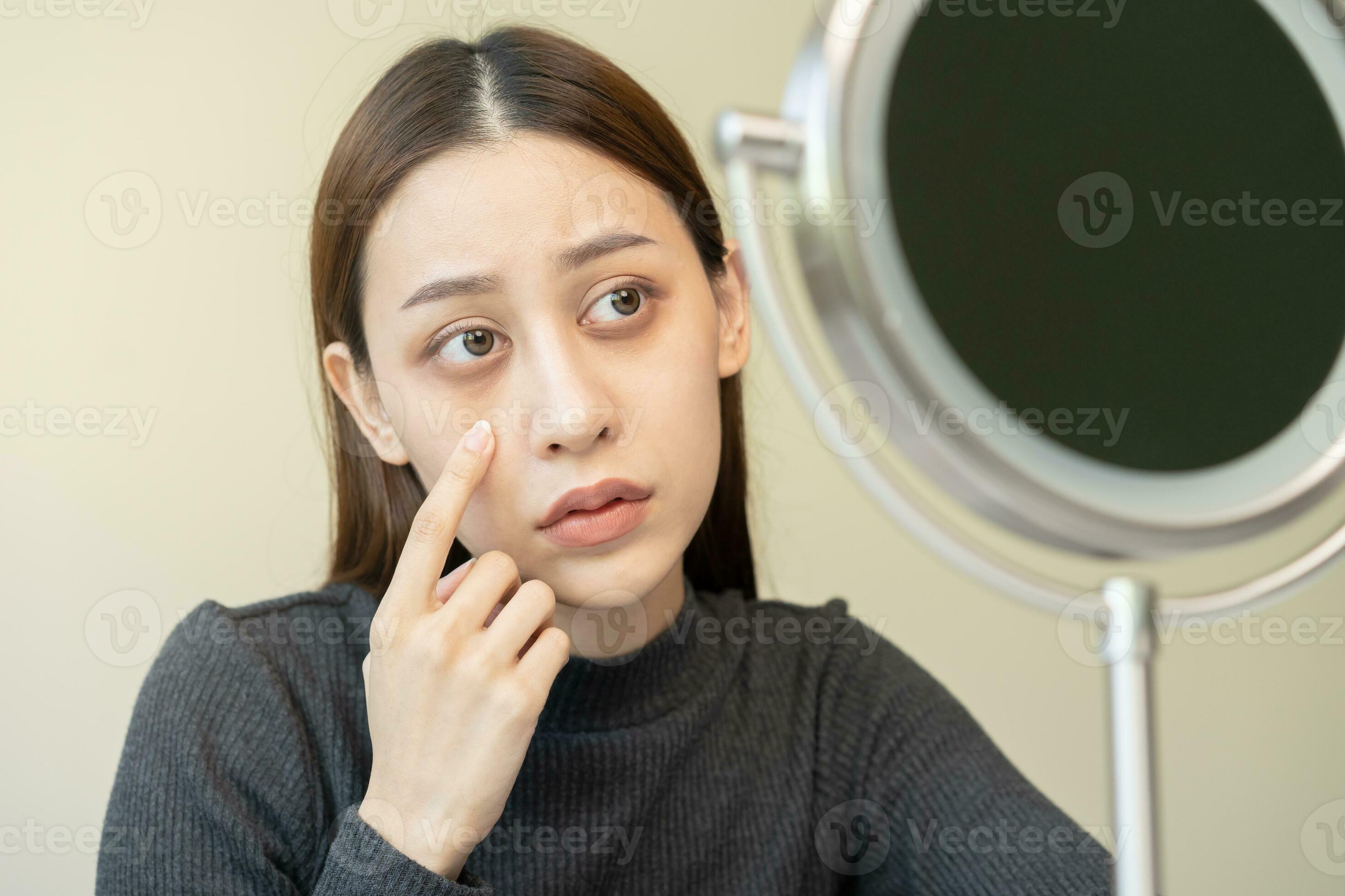 Bored, insomnia asian young woman, girl looking at mirror hand touching ...