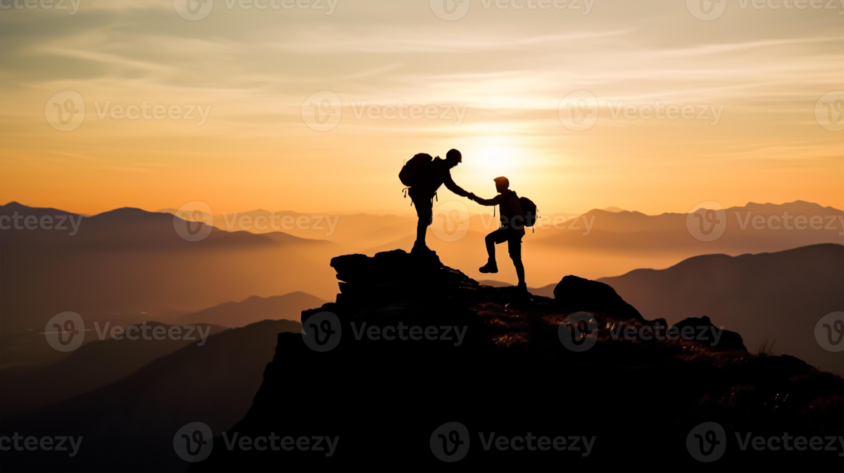 friendship help each other trust silhouette in mountains, sunrise. Teamwork of two men helping ...