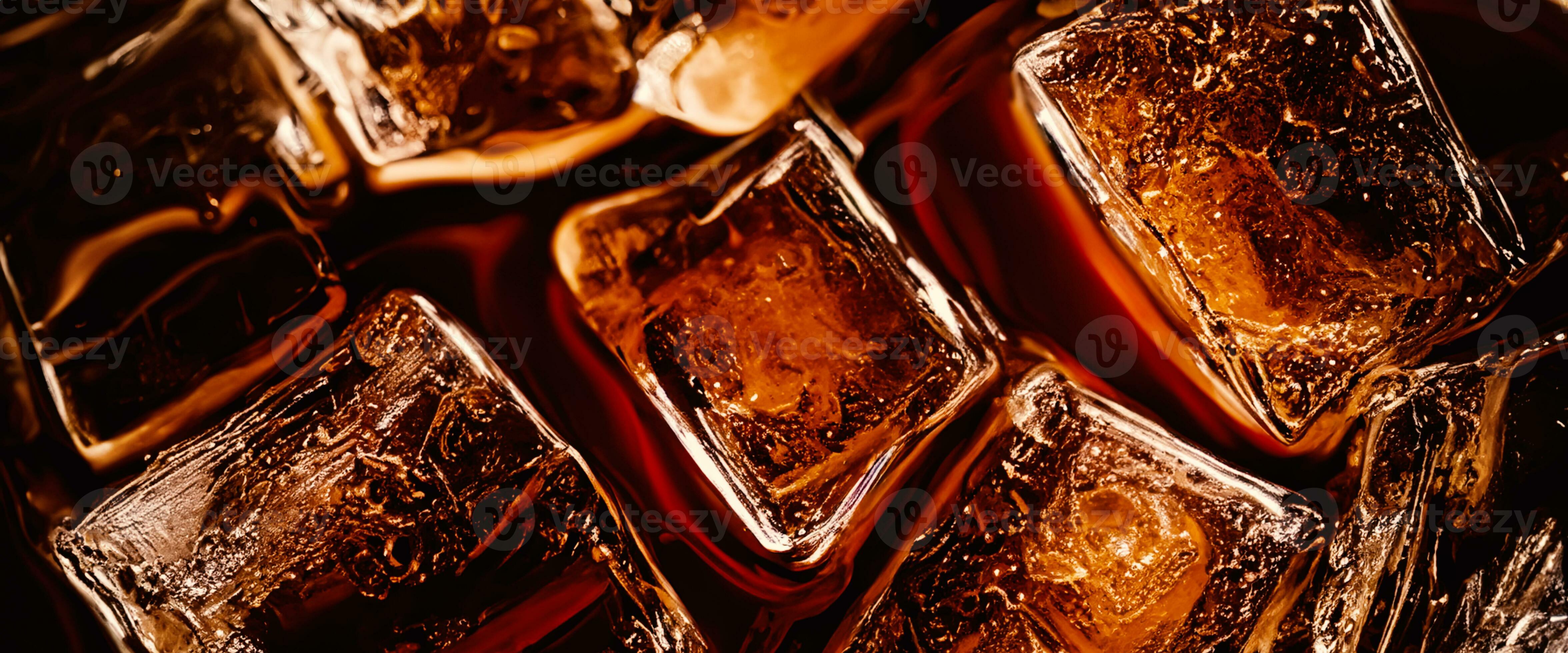 Cola with Ice. Close up of the ice cubes in cola water. Texture of carbonate drink with bubbles ...