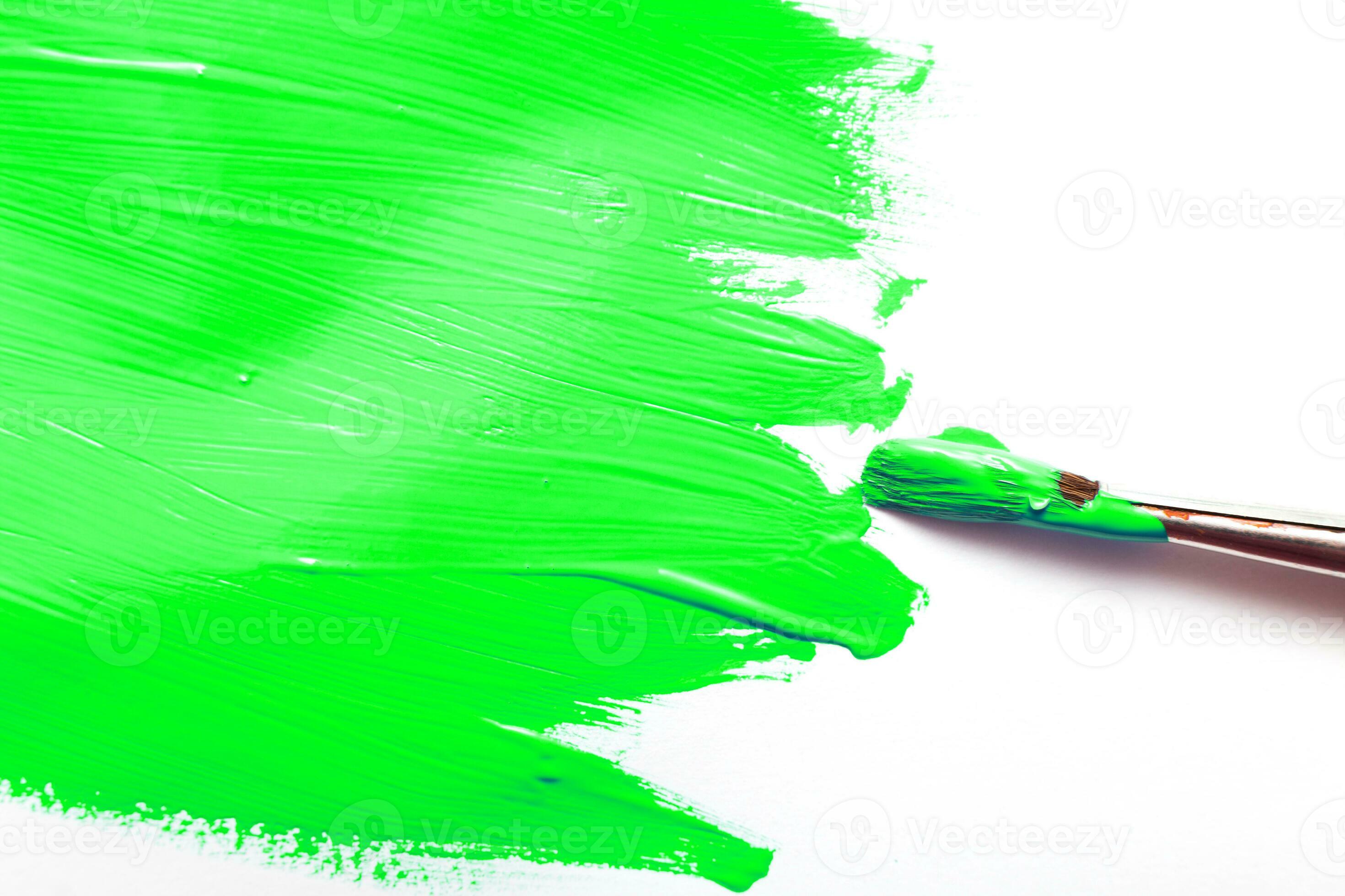 brush with green color and Abstract acrylic green painted spot ...