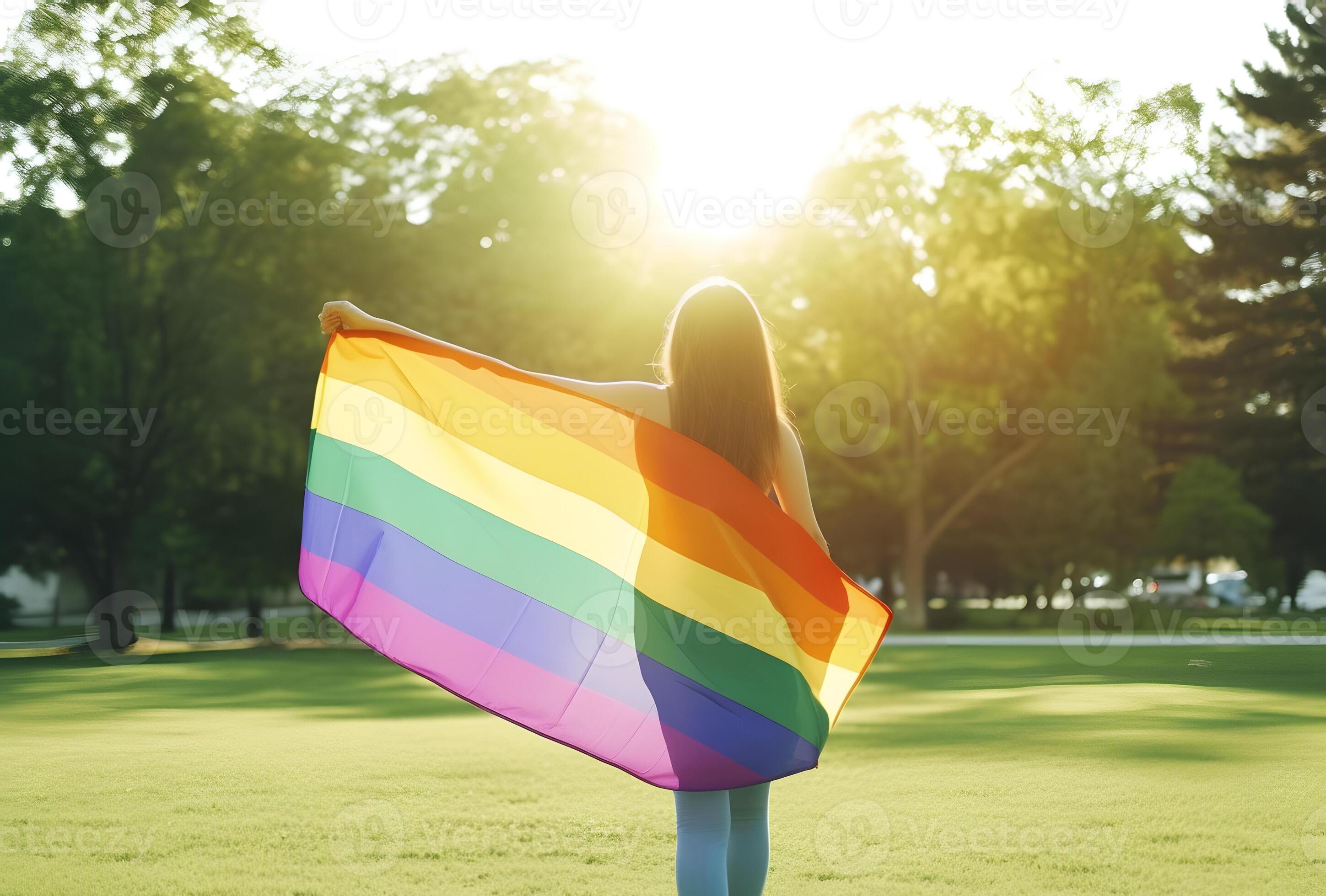 Girl holding rainbow flag. Concept of LGBT pride. 25529178 Stock Photo at Vecteezy