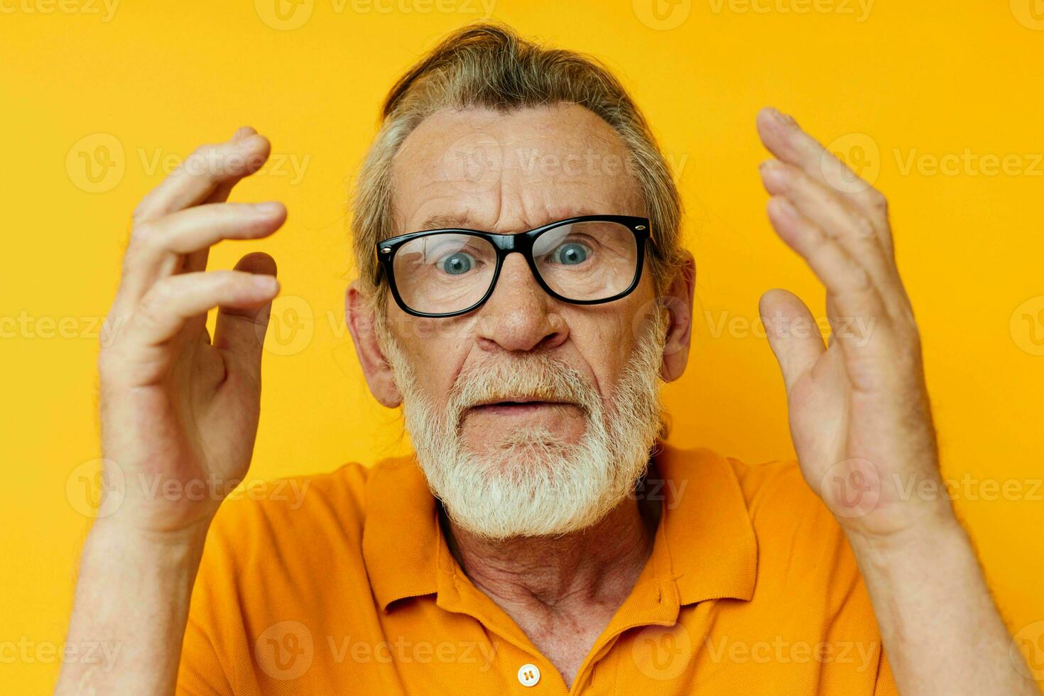 Portrait Elderly Man Posing Yellow Tshirt Glasses Yellow Background