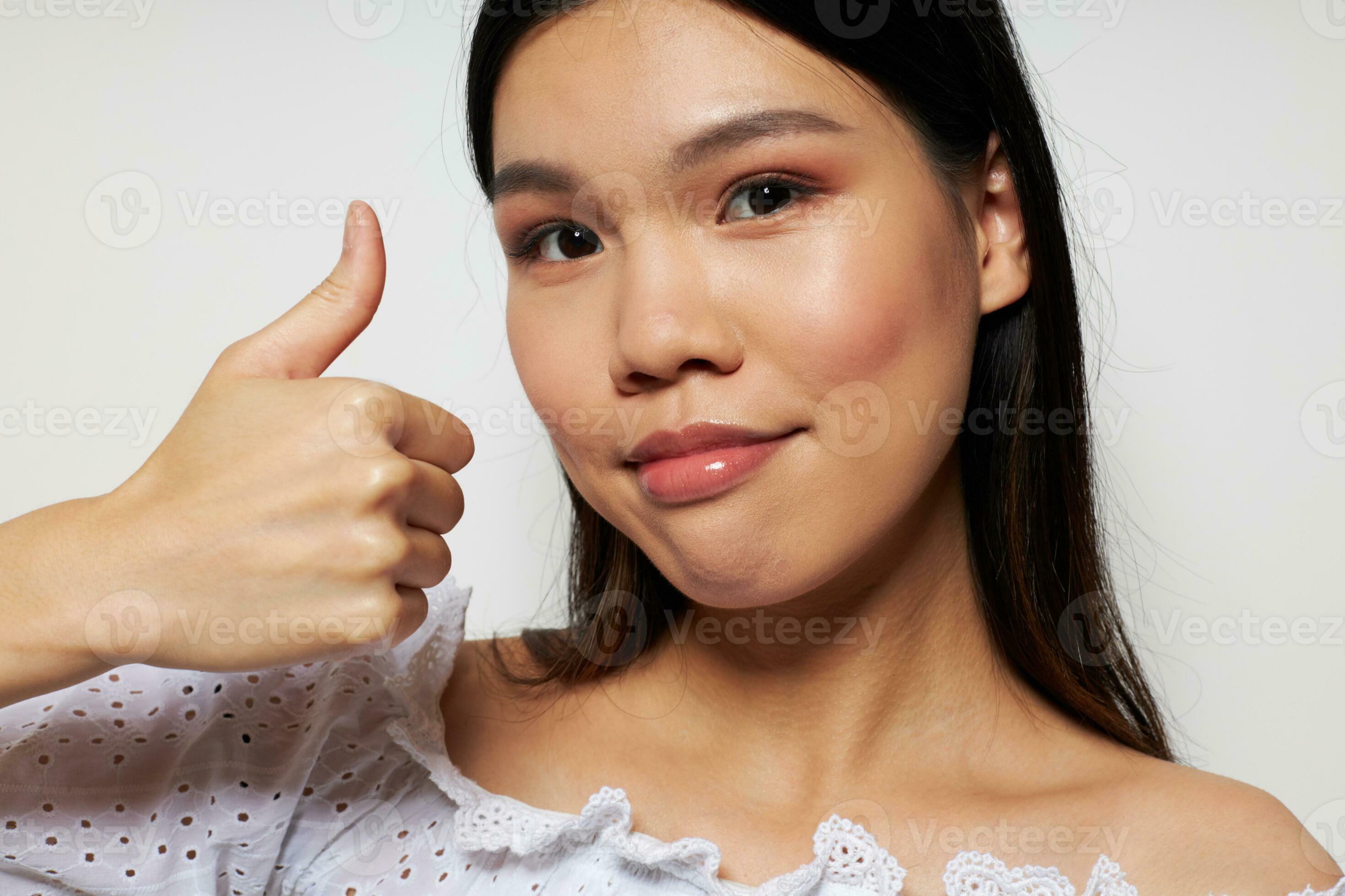 Cheerful Asian Woman Gesturing With Hands Smile Model 25703604 Stock