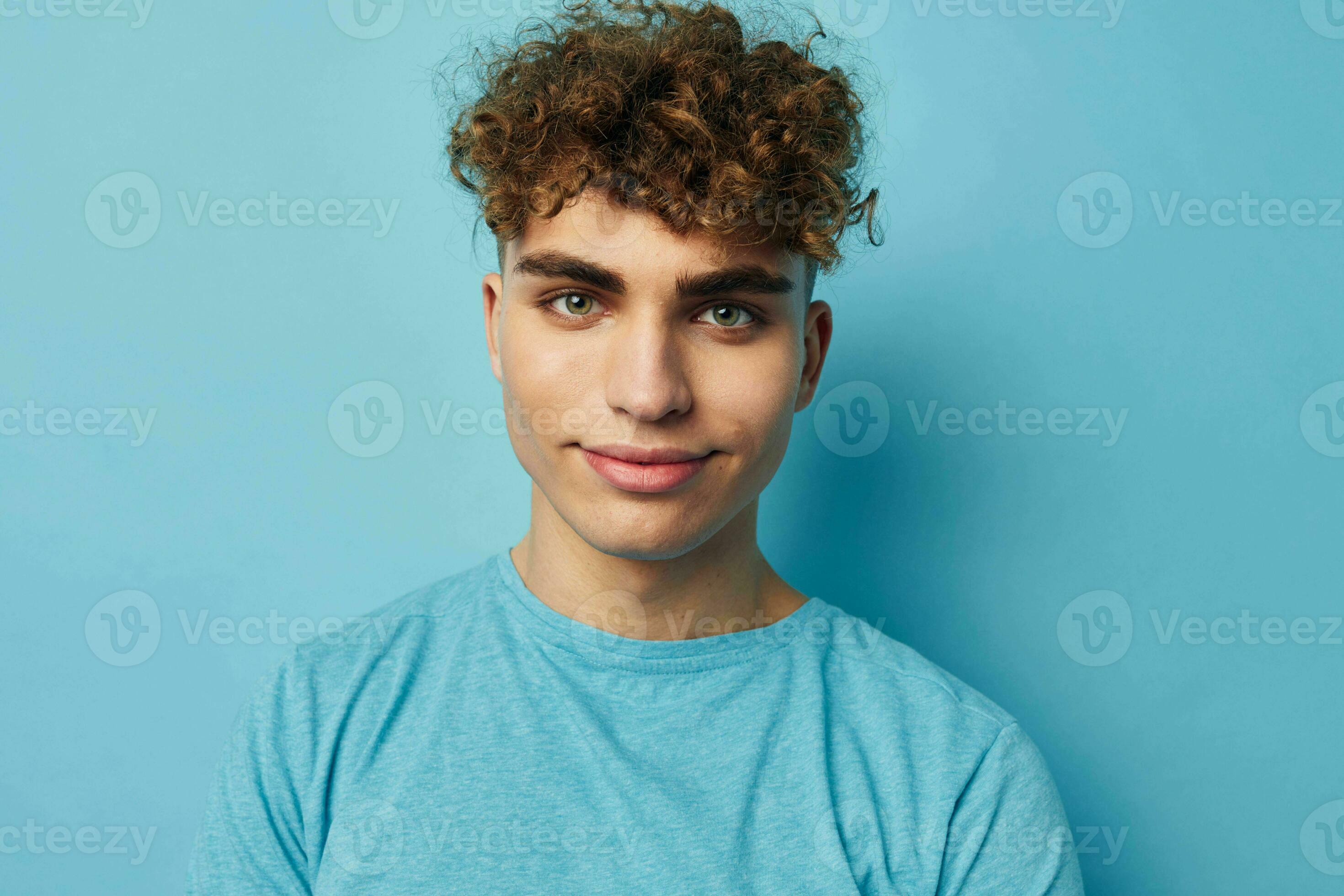 Handsome Guy In Blue T Shirts With A Pumped Up Body Isolated Background