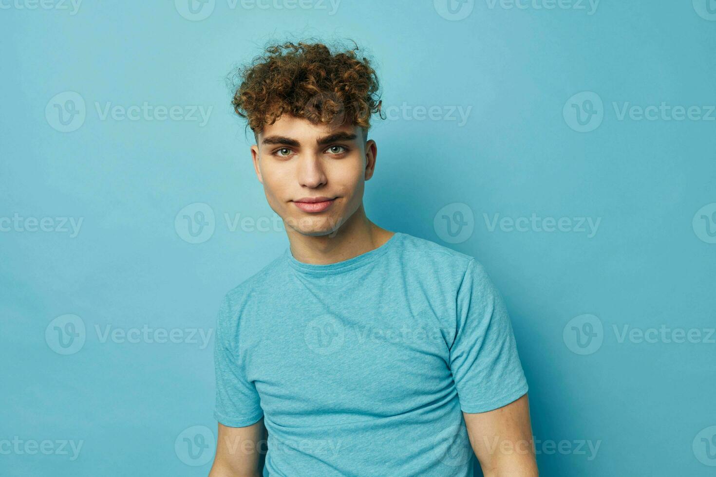 Attractive Man In Blue T Shirts With A Pumped Up Body Blue Background