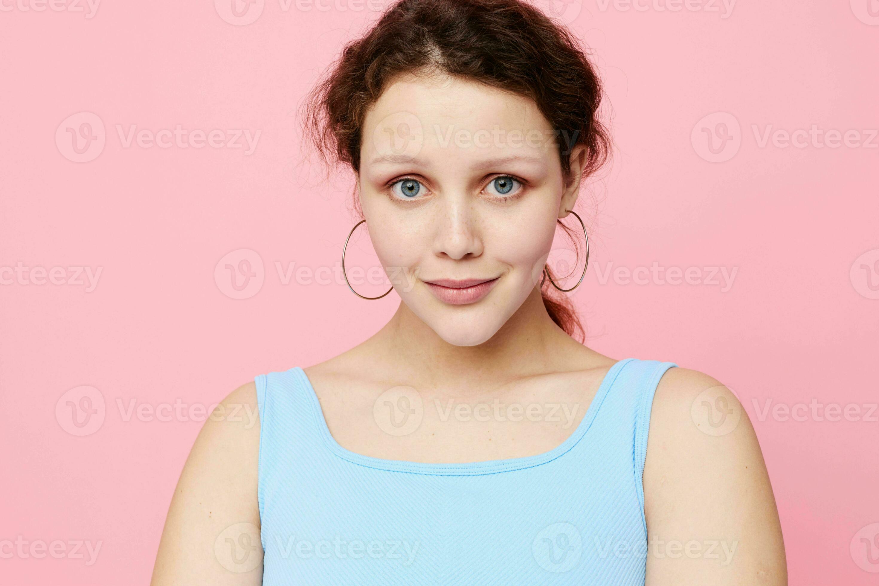 funny girl grimace close-up emotions earrings posing isolated ...