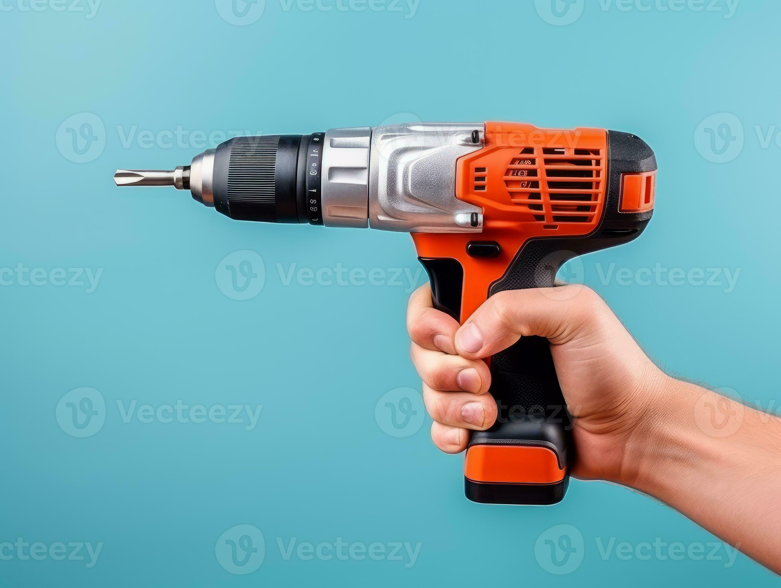 Hand-holding power drill 25796961 Stock Photo at Vecteezy