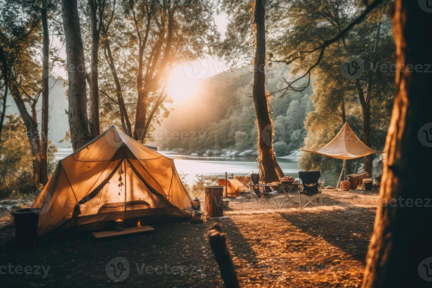 Beautiful morning landscape with camping tent at sunrise. Camping in ...
