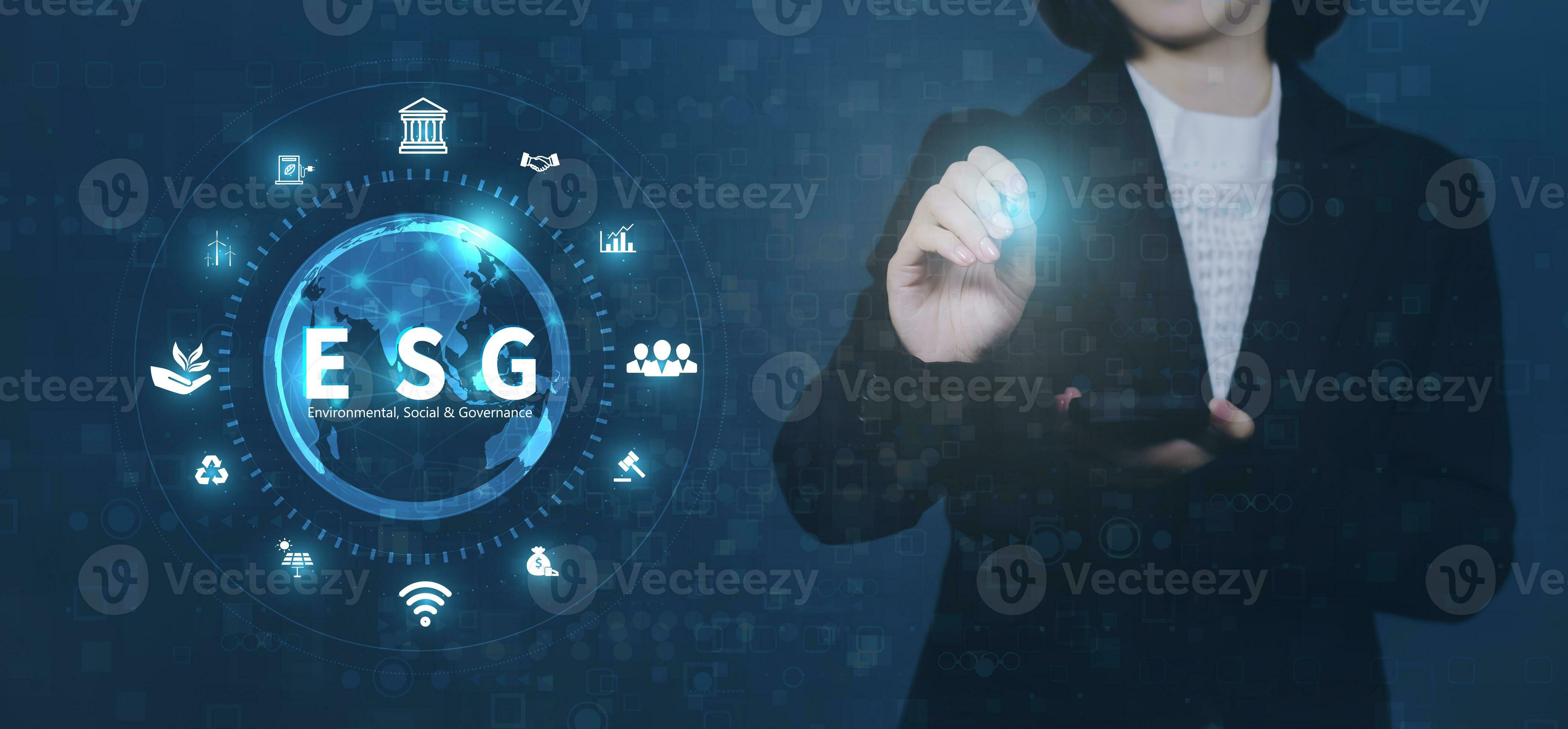 ESG. environment social governance investment business concept. Businessmen use a computer to ...