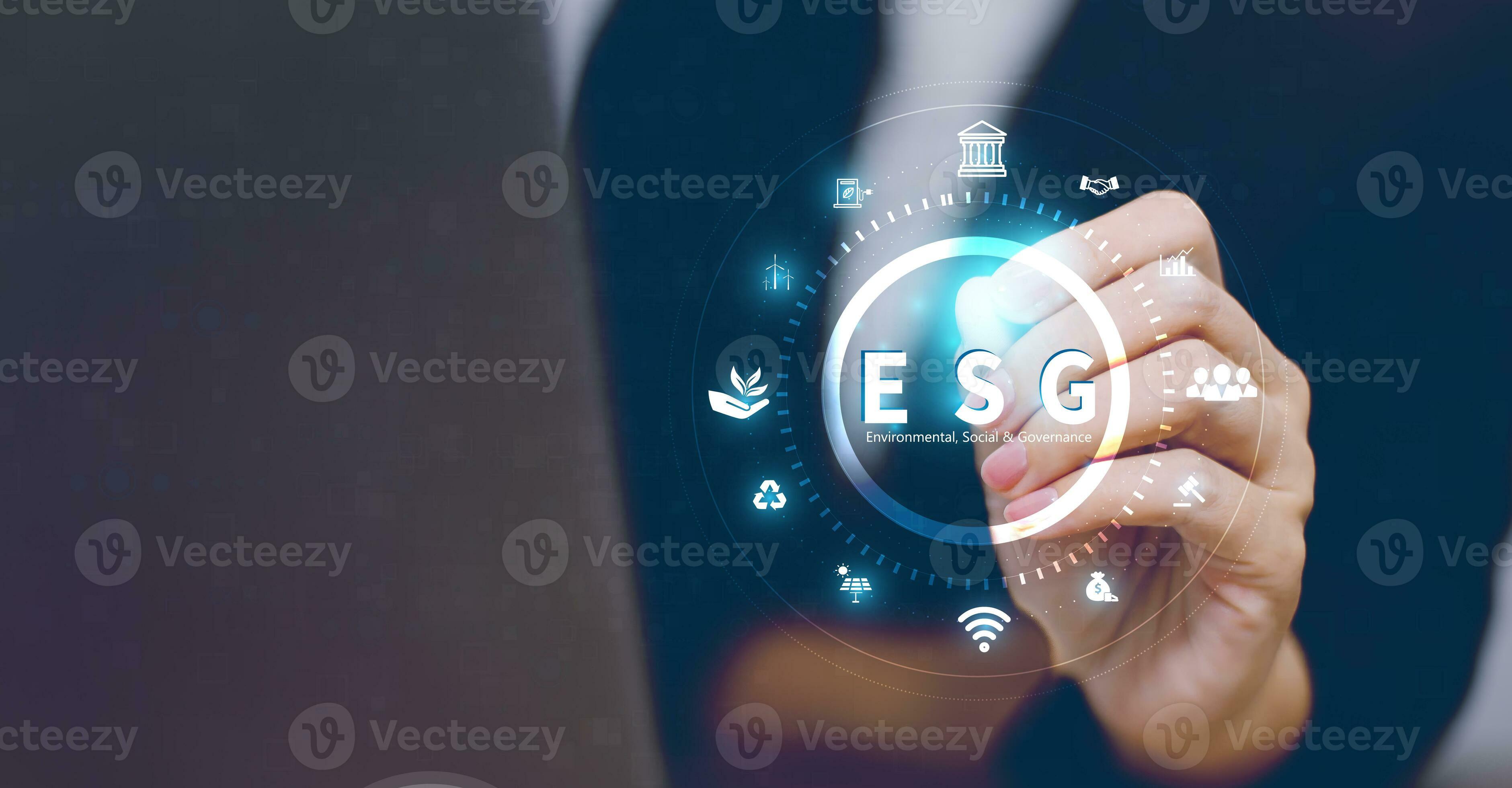 ESG. environment social governance investment business concept. Businessmen use a computer to ...