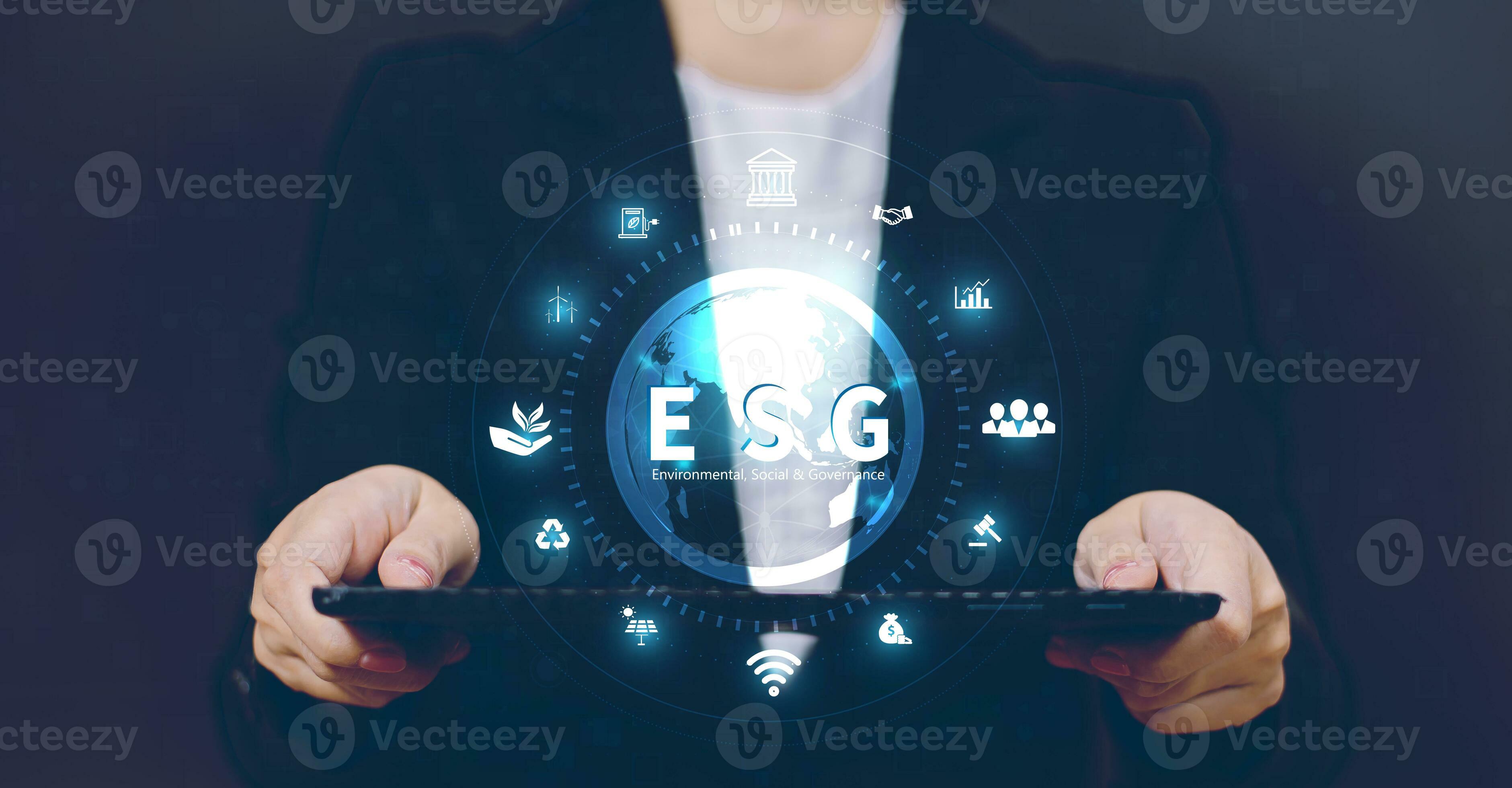 ESG. environment social governance investment business concept. Businessmen use a computer to ...