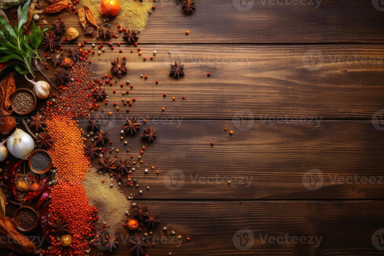Top view of a lot of spices on a wooden table with copy space created with technology. 26151563 ...