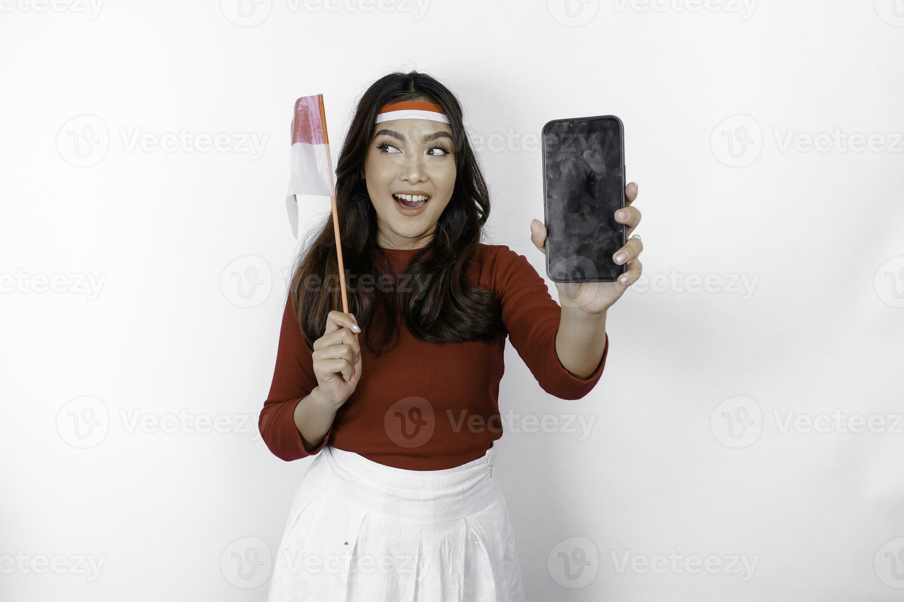 A Happy Asian Woman Wearing Headband Holding Her Phone And Indonesian