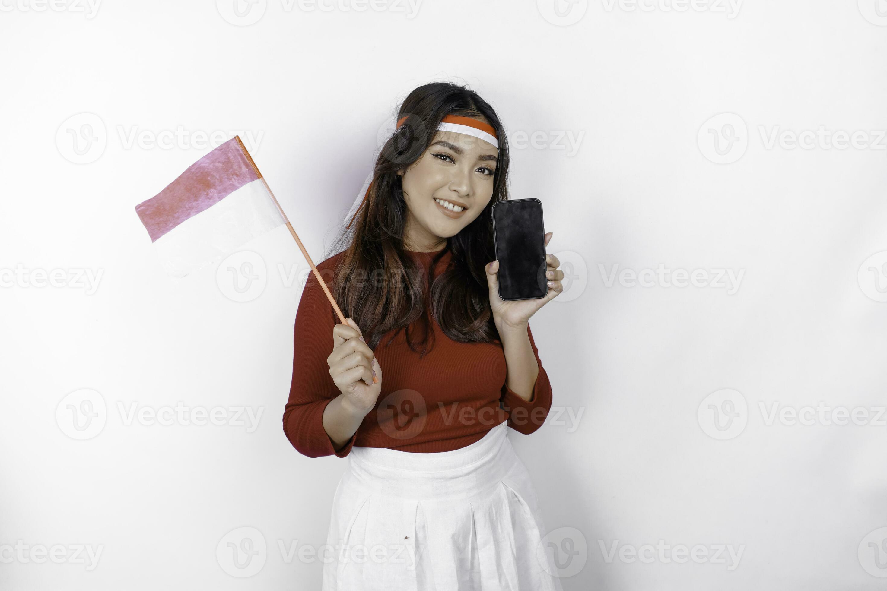 A Happy Asian Woman Wearing Headband Holding Her Phone And Indonesian