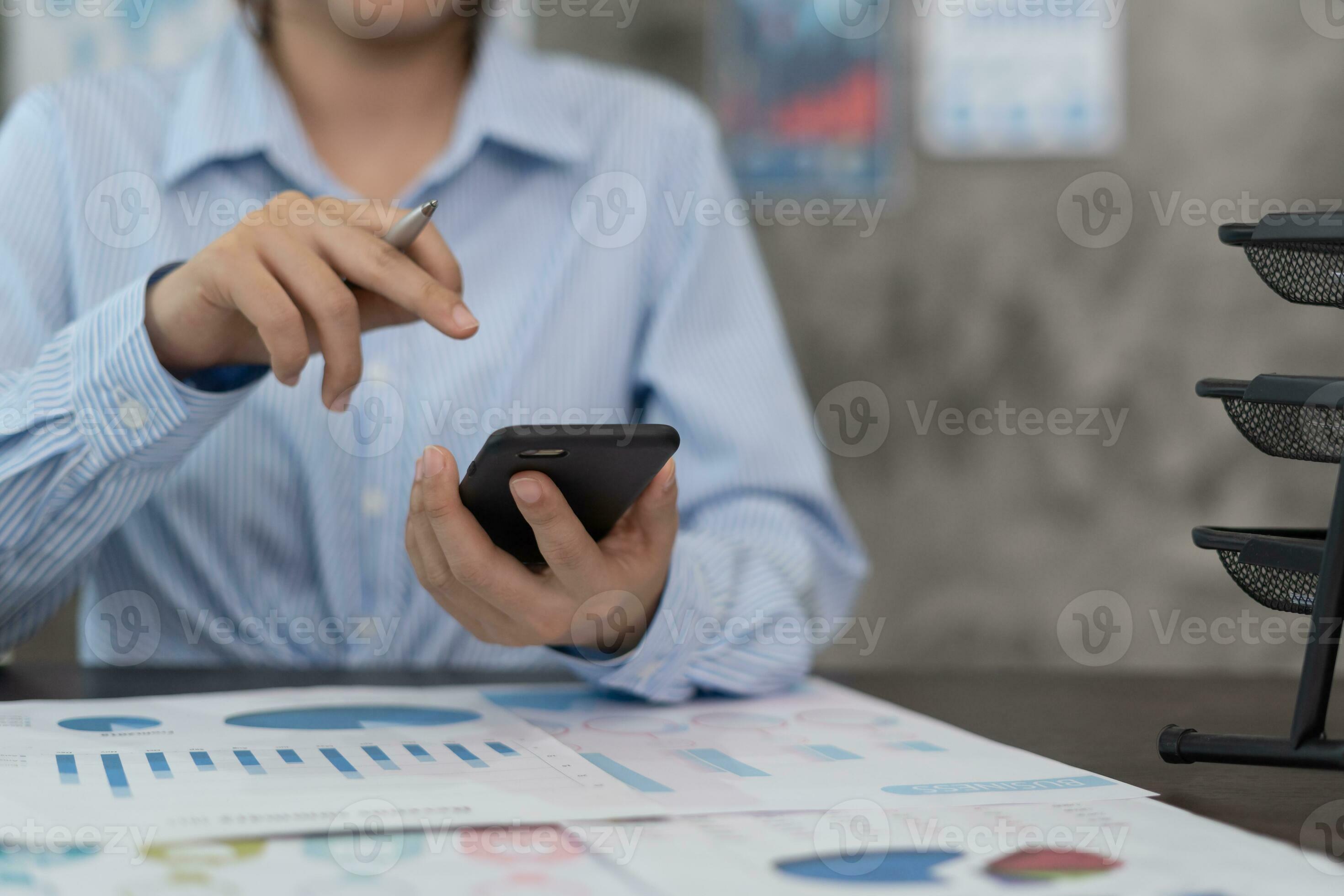 Business women calculate benefit, spreadsheets, graph financial ... Business women calculate benefit, spreadsheets, graph financial ...