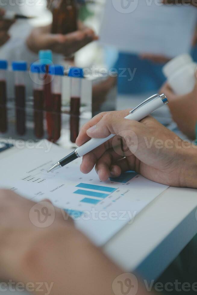 Cropped image of successful medical doctors discussing diagnosis during ... Cropped image of successful medical doctors discussing diagnosis during ...