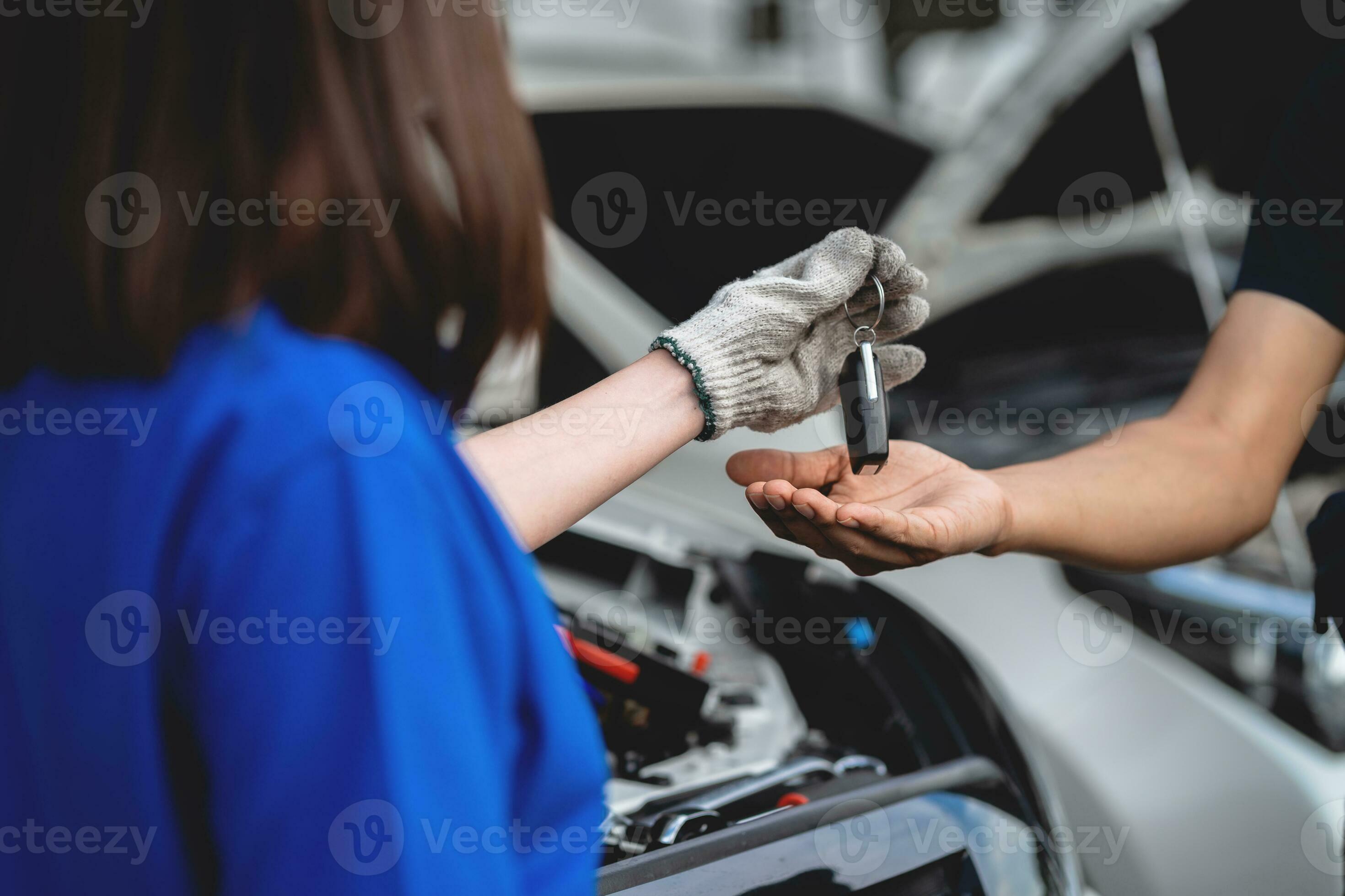 Concept of handover of car keys after inspection and maintenance by ... Concept of handover of car keys after inspection and maintenance by ...