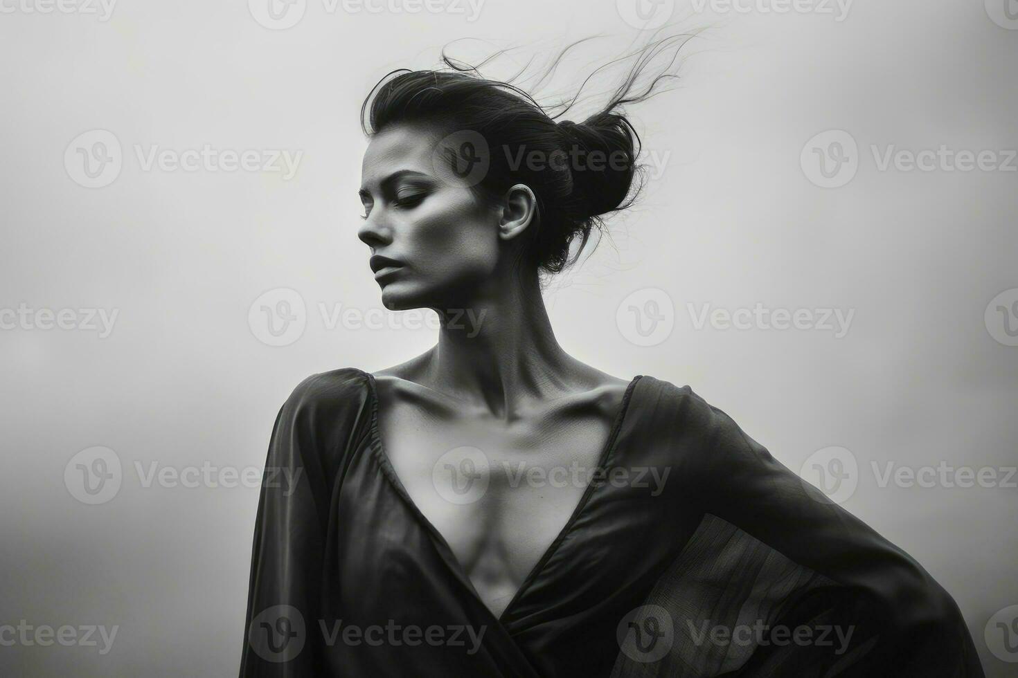 A Dramatic Black And White Female Model Portrait That Evokes A Sense Of