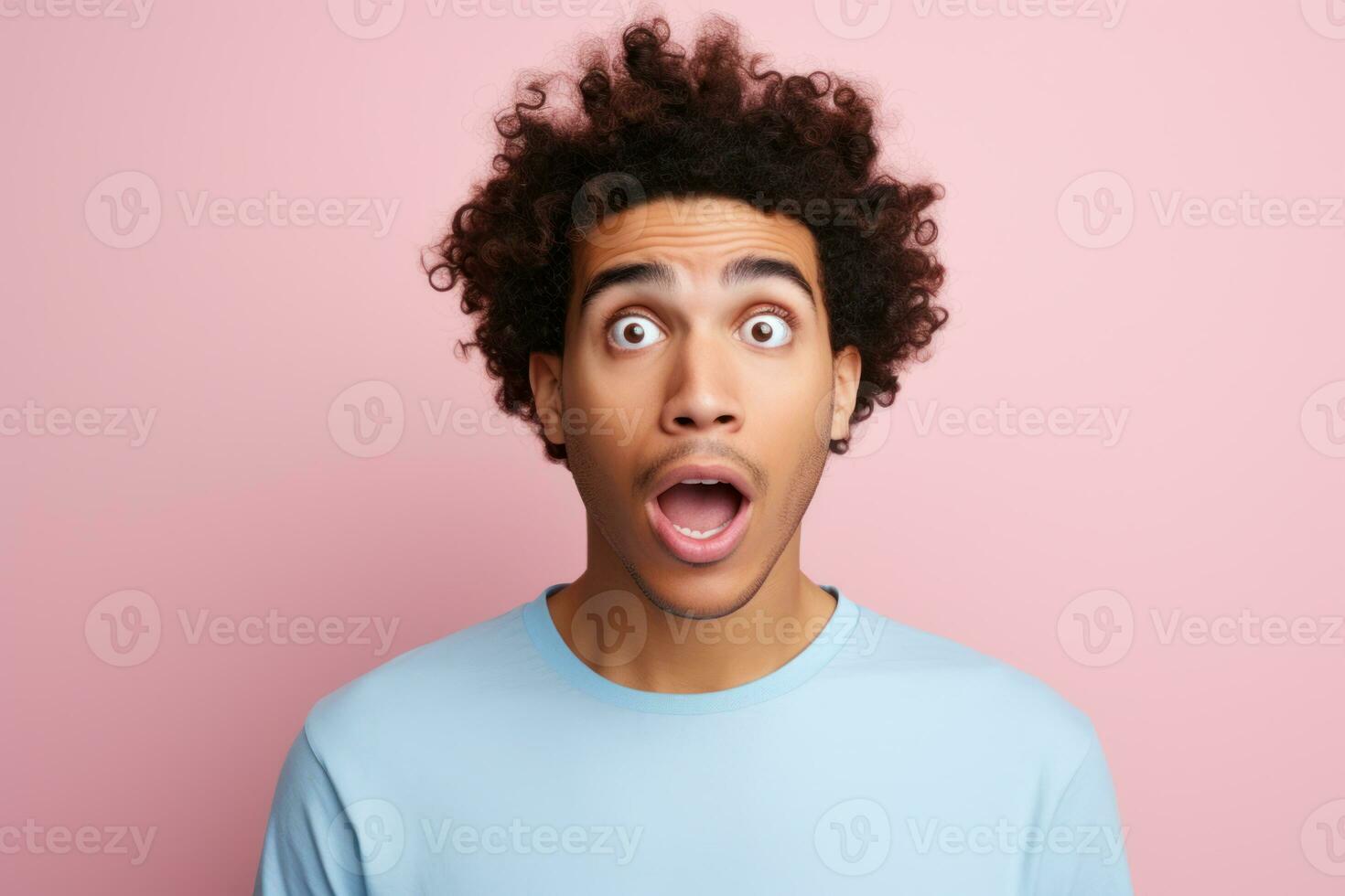 Surprised happy man looking in excitement. Isolated on pastel ...