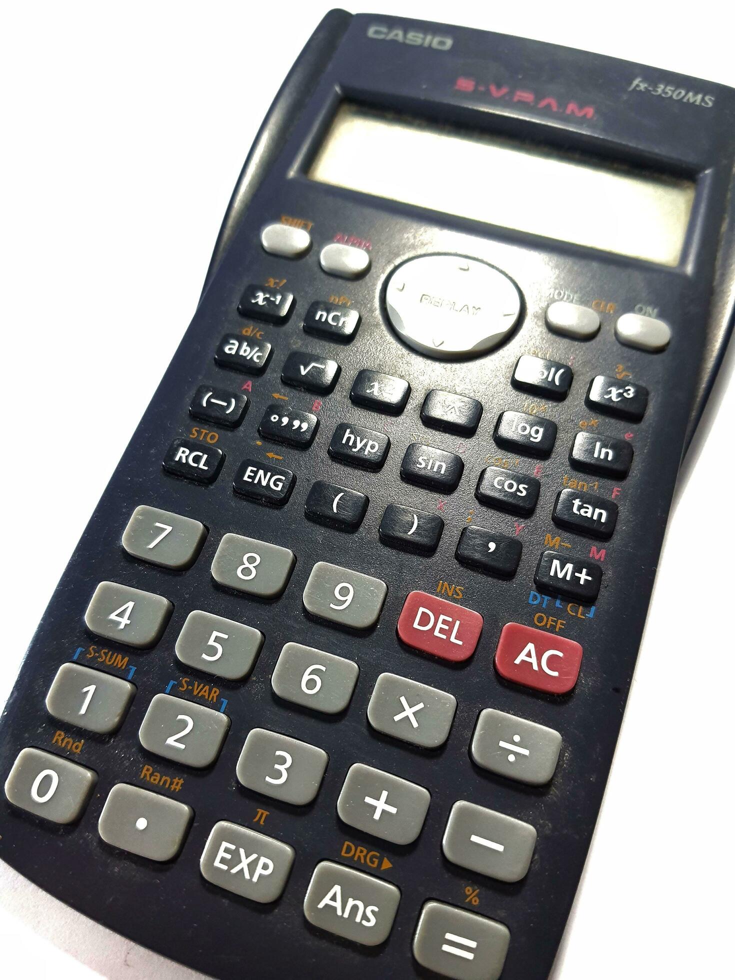 Close up photo of the buttons in the scientific calculator. 26945594 ...