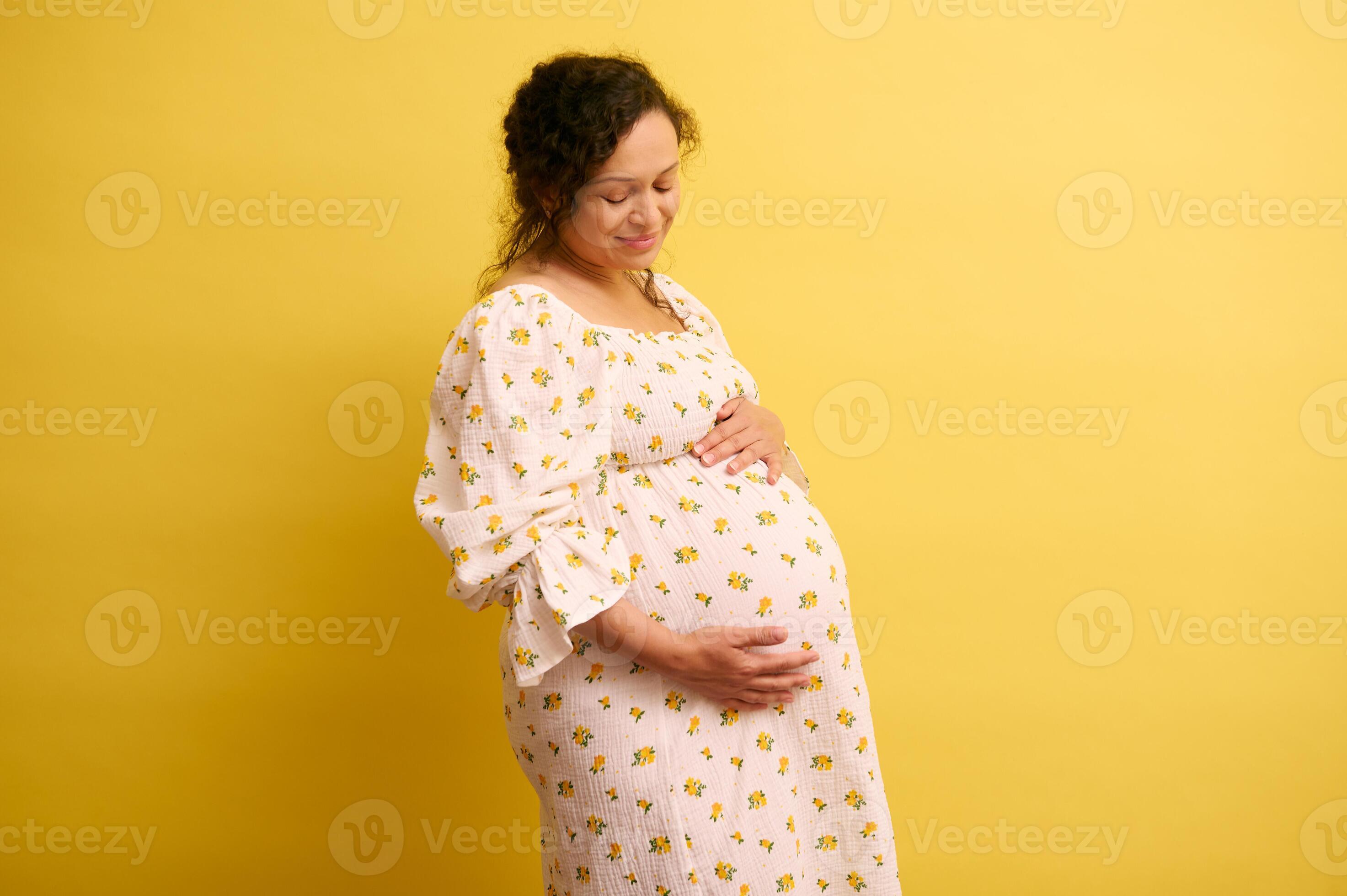 Pregnant Woman Gently Stroking Her Big Belly Over Yellow Background Copy Space Pregnancy 40