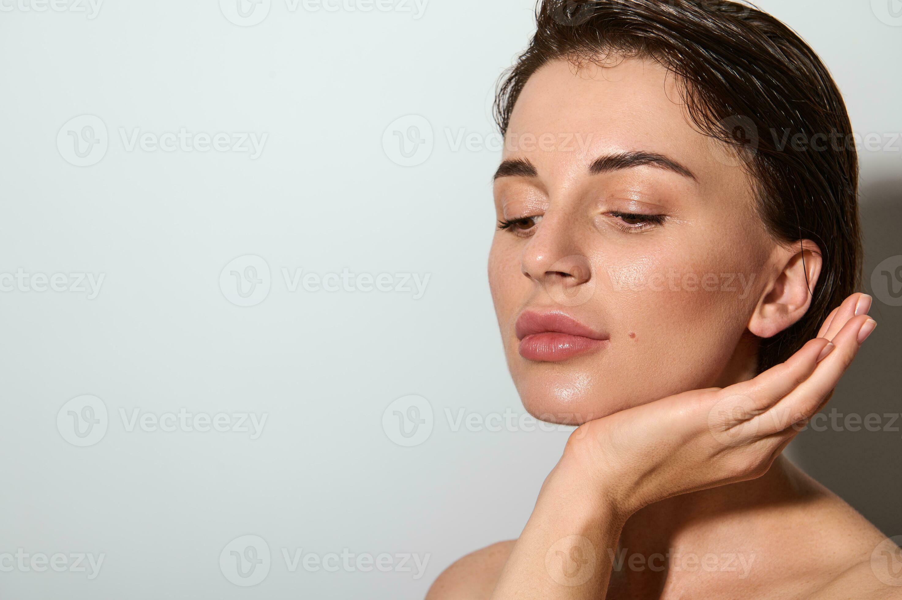 Close Up Face Portrait Of Dark Haired Elegant Woman With Healthy Clear