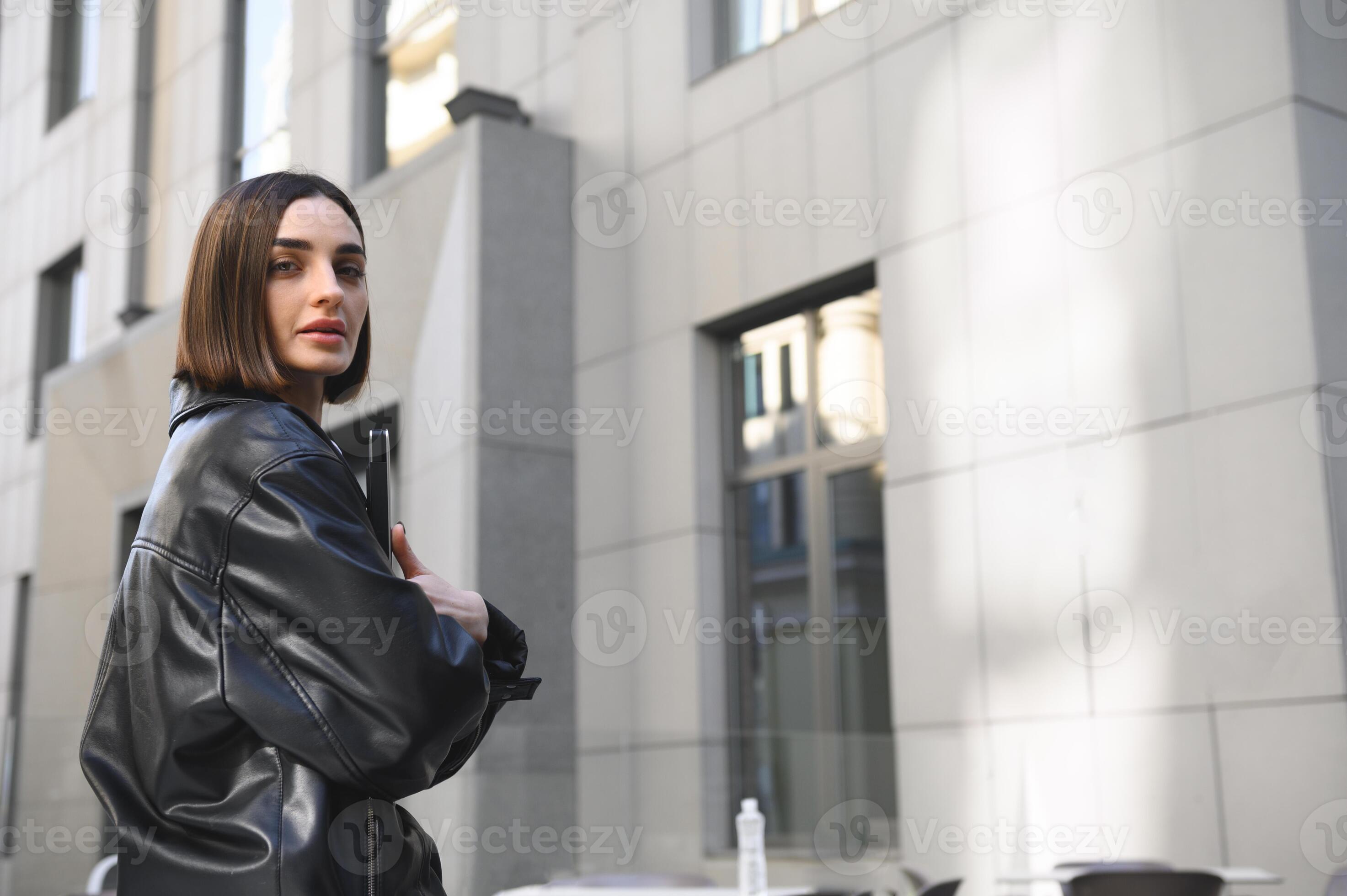 Successful self-confident attractive woman, business person, freelancer ...