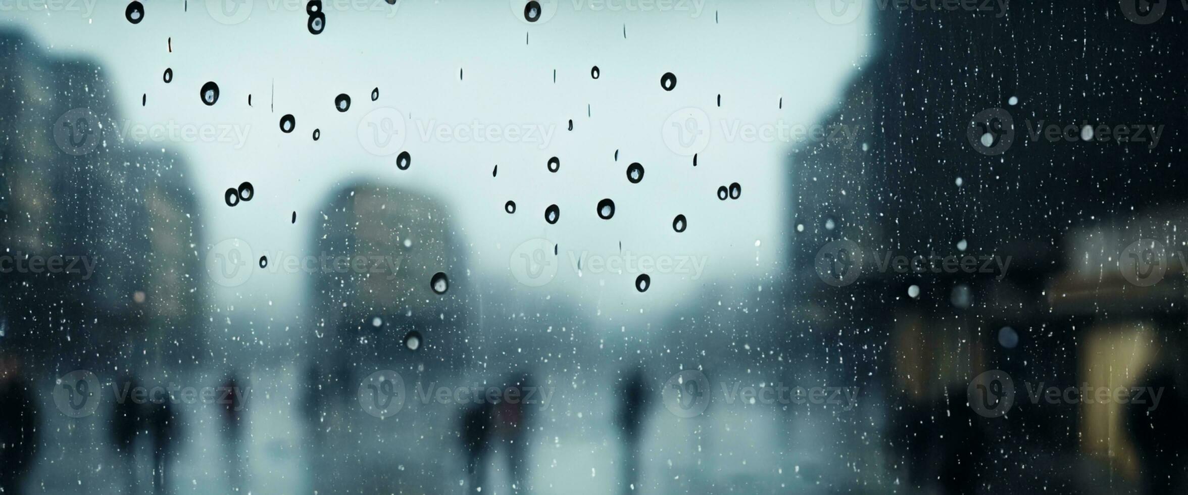 Rain drop on window glass of coffee shop and blurry city life background. Rainy season and ...