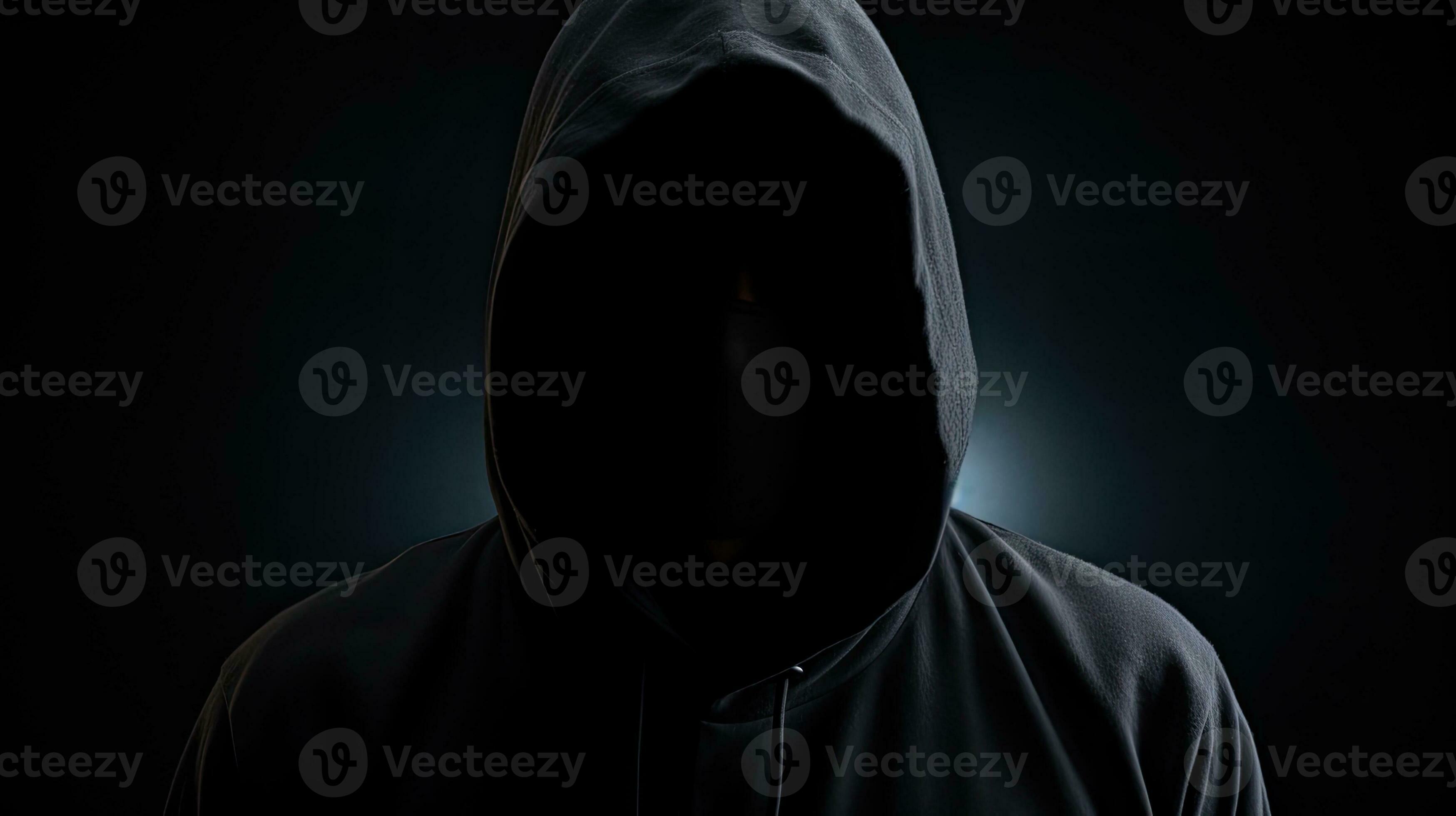Silent figure in hood on dark backdrop concealed face symbolizing criminality mystery secrecy ...
