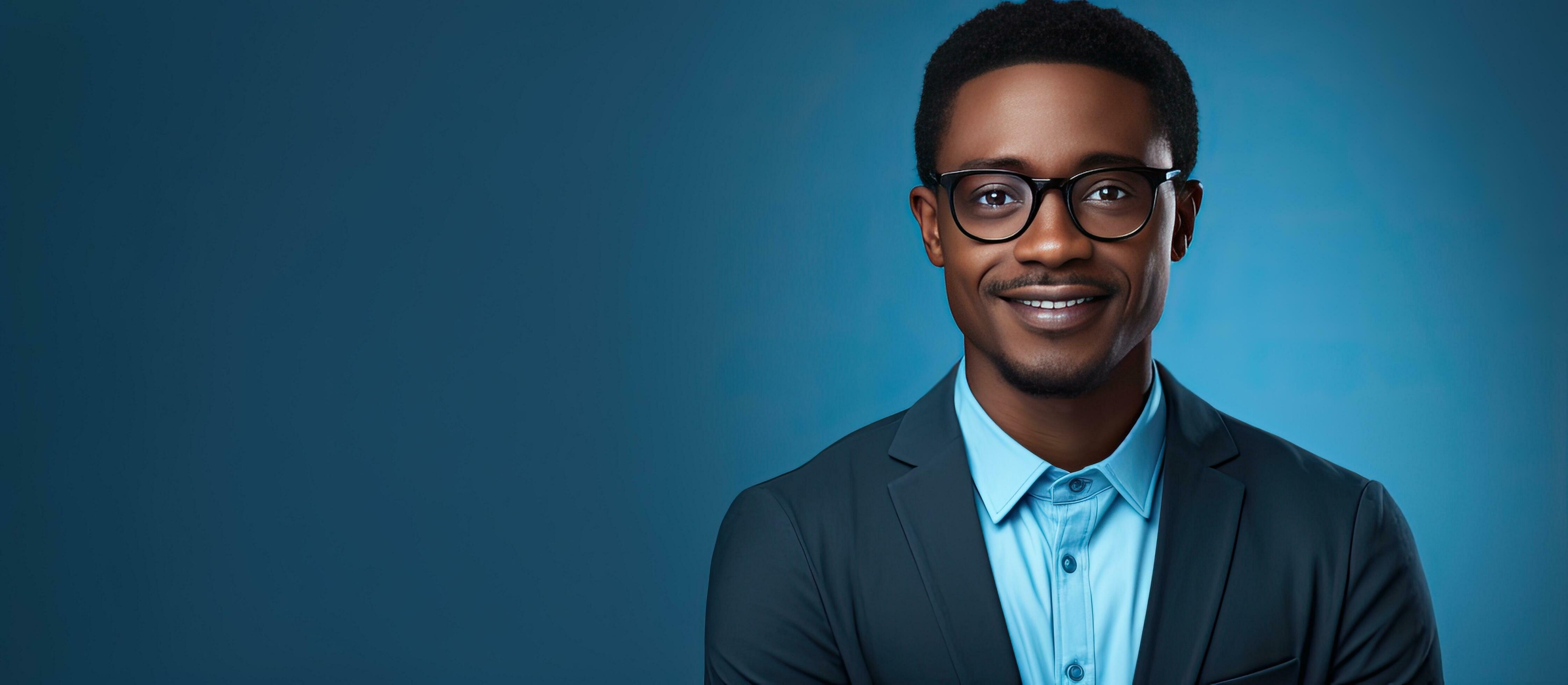 Portrait Of A Smiling African American Man Wearing Glasses Posed