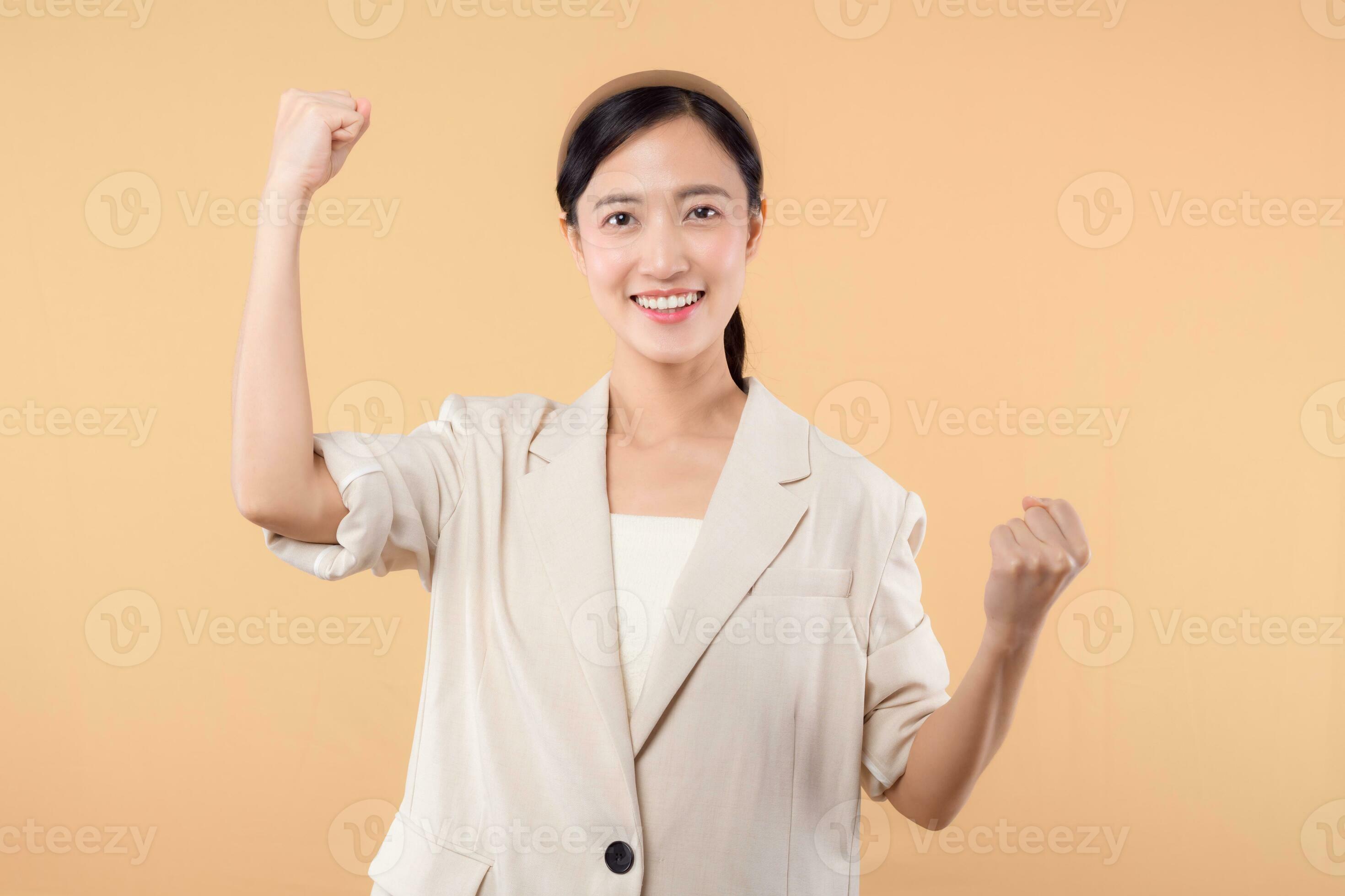 Studio portrait of happy successful confident young asian business ... Studio portrait of happy successful confident young asian business ...